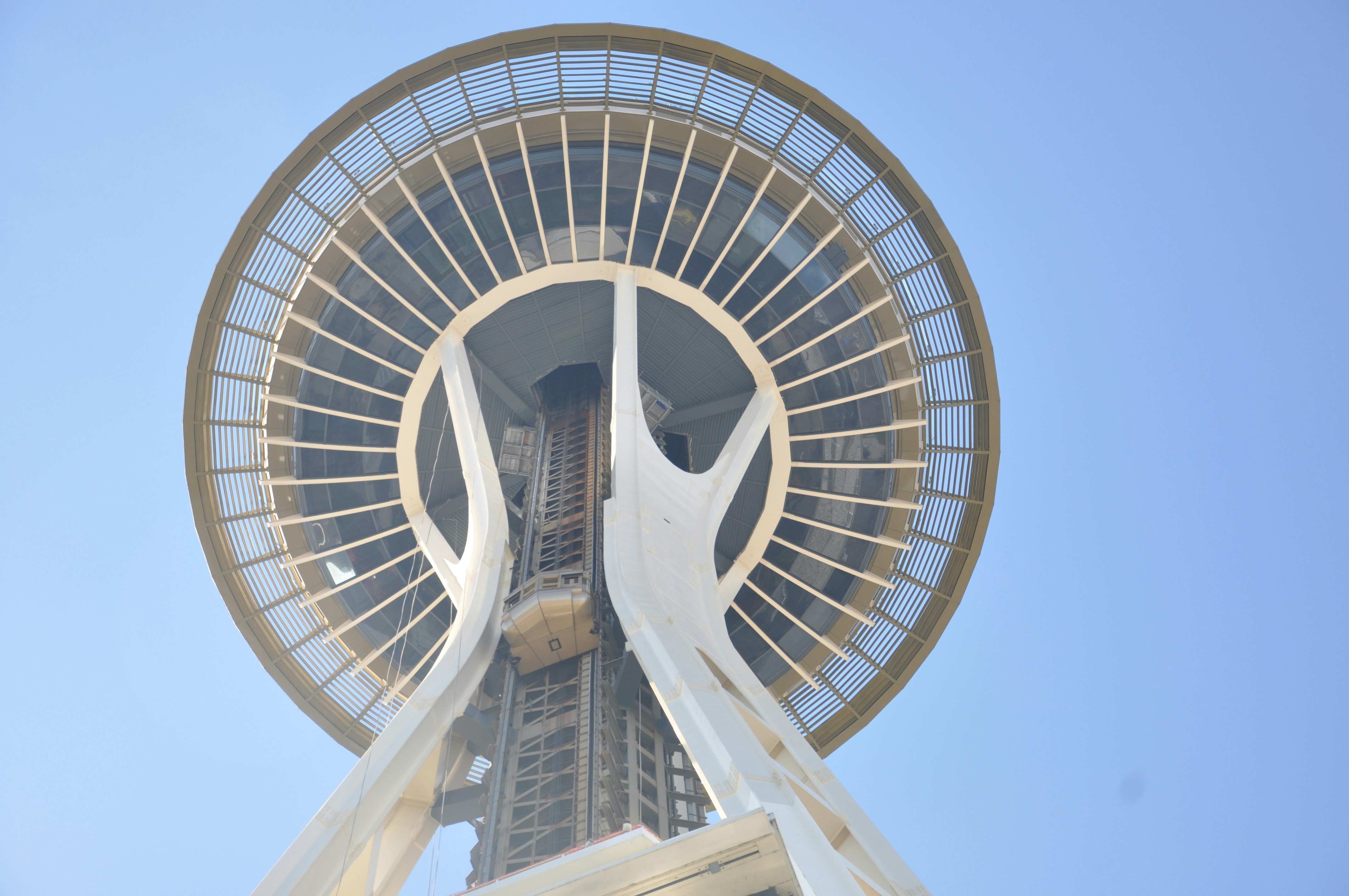 Skyward Ring: The Space Needle's Circular Crown from Beneath