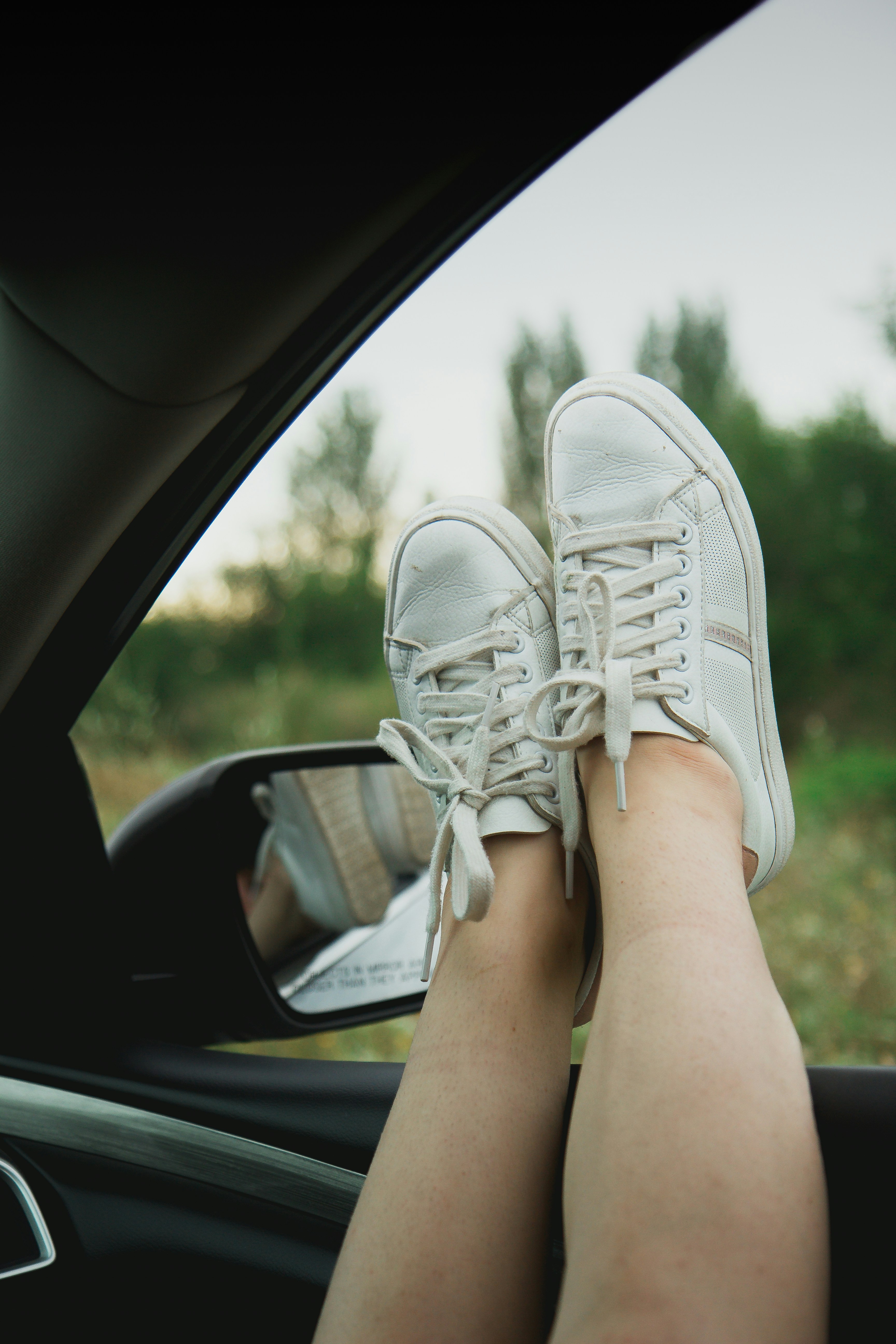 Feet Propped on the Car Window: Casual Escape