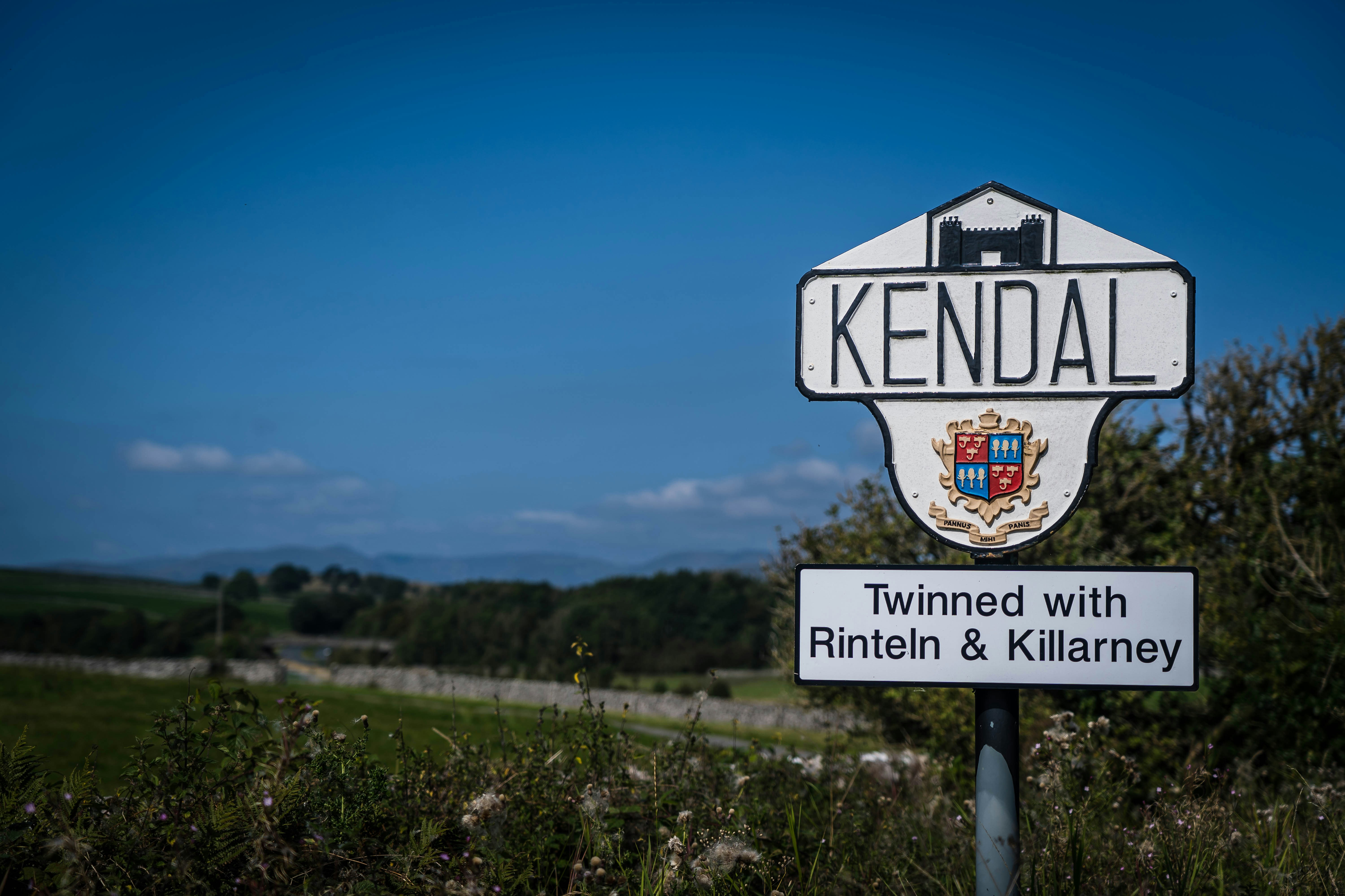 White and black street sign photo – Free Kendal Image on Unsplash