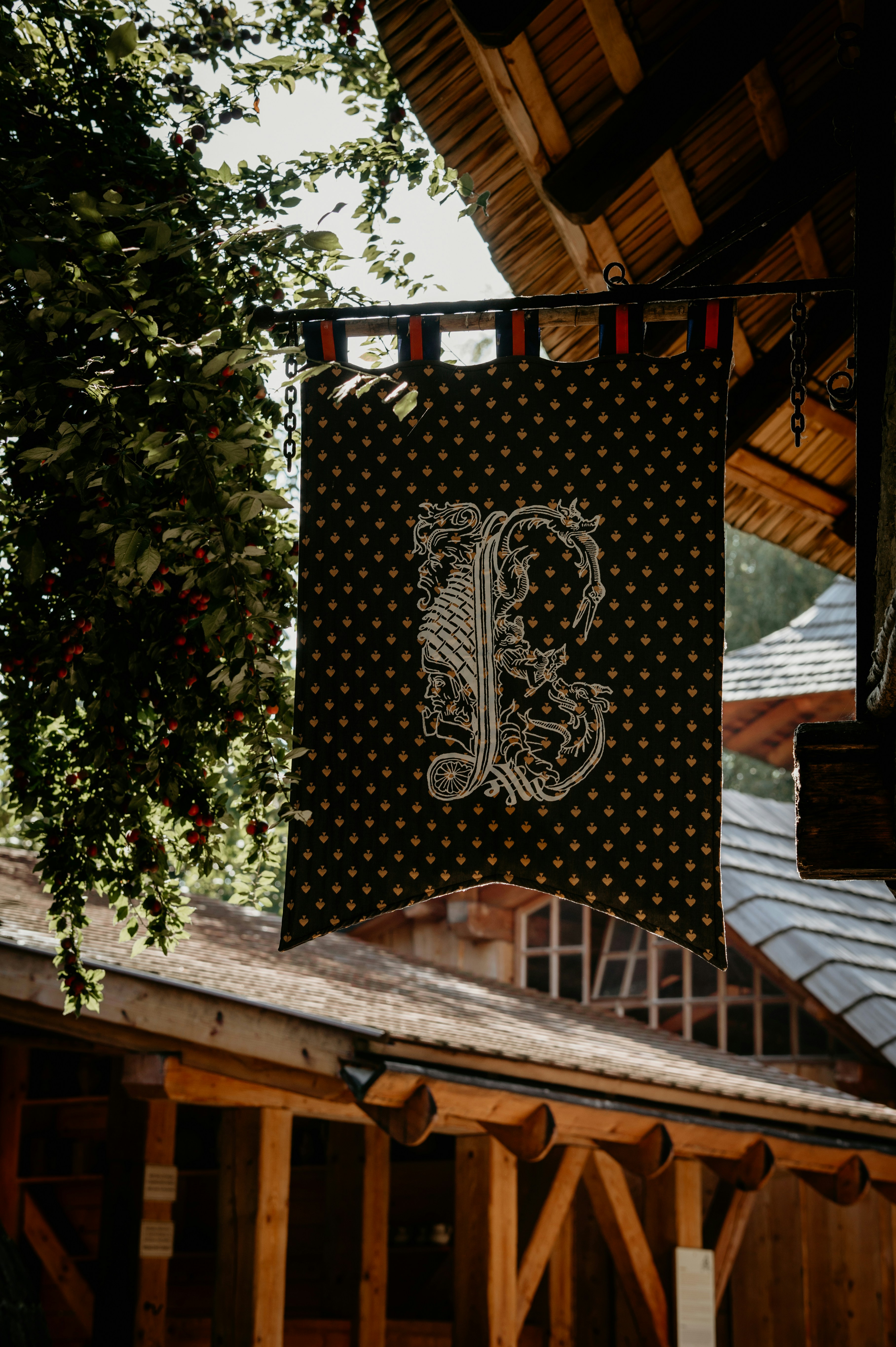Ornate Banner at the Eaves of a Timbered Lodge