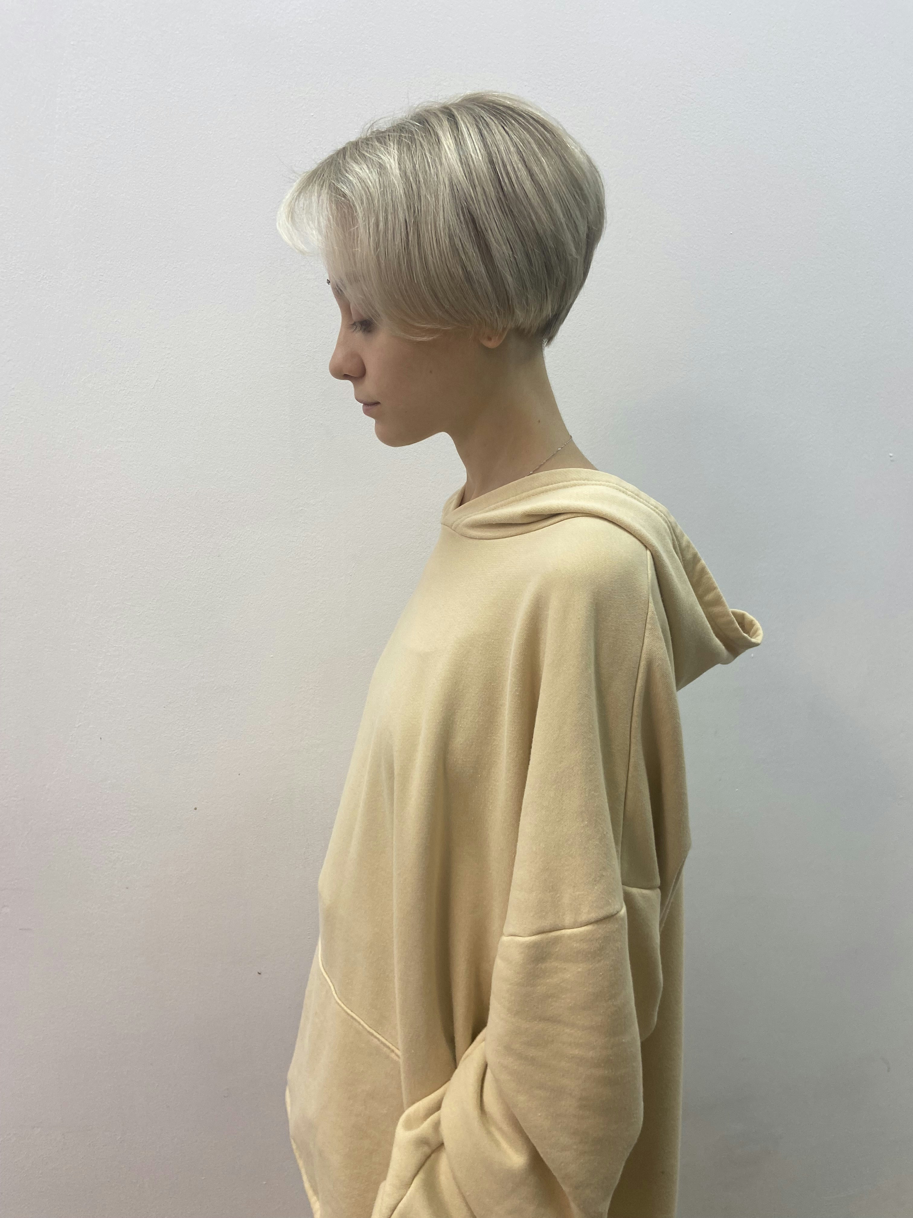 Profile in Neutral Light: Quiet Confidence in Beige