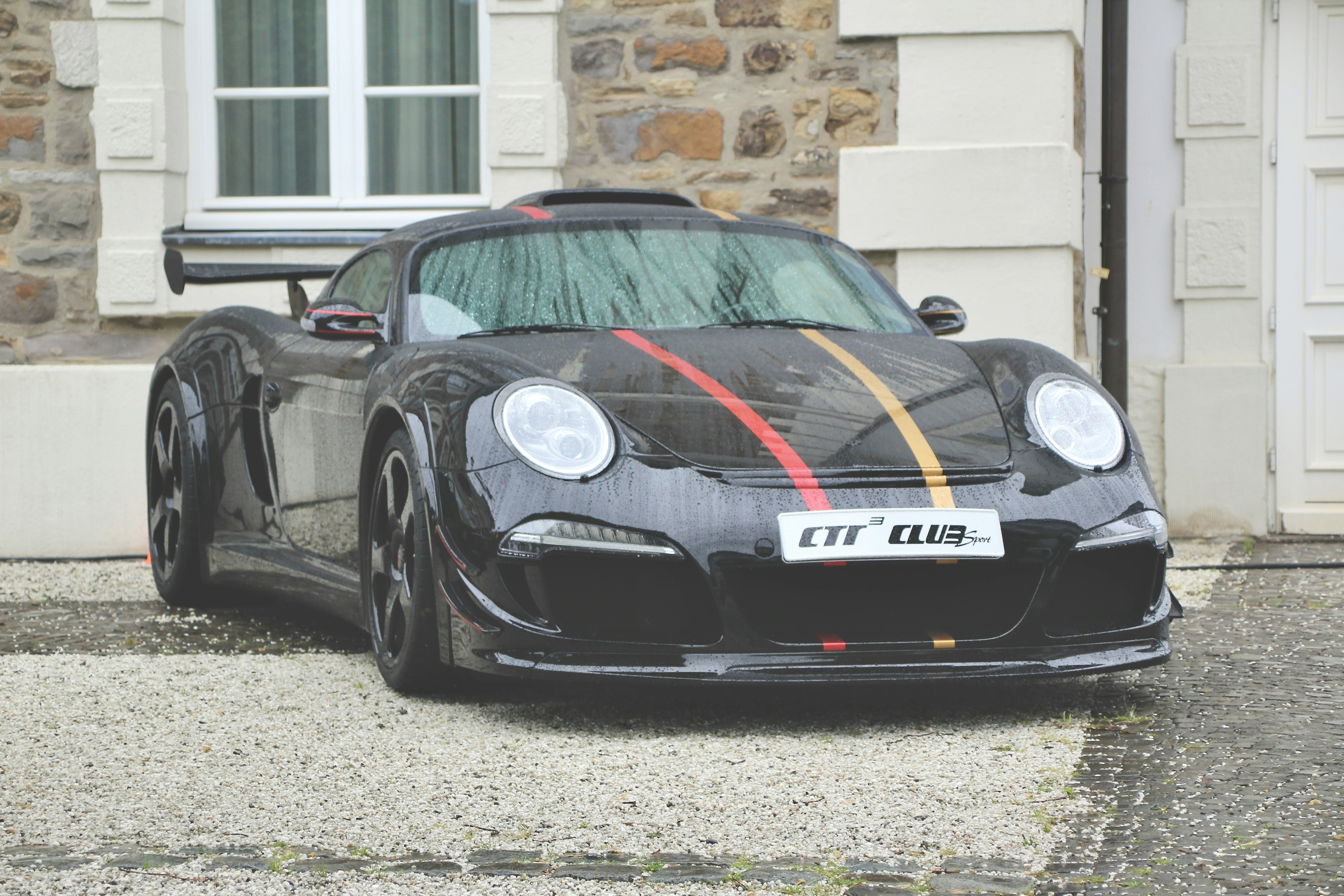 Stripe-Lined Porsche GT3 RS in a Stone Courtyard