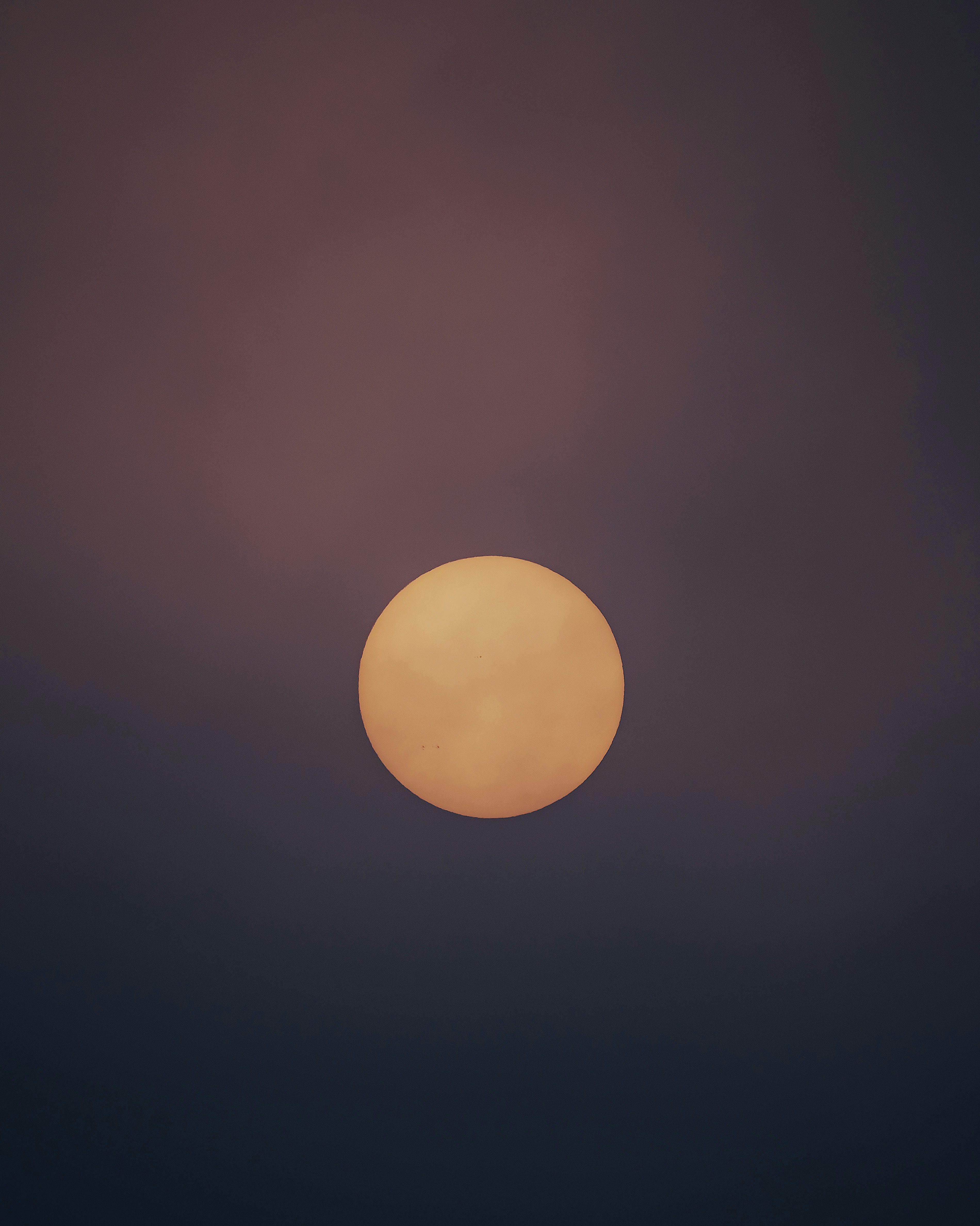 Yellow round light on black background photo – Free Purple sky Image on ...