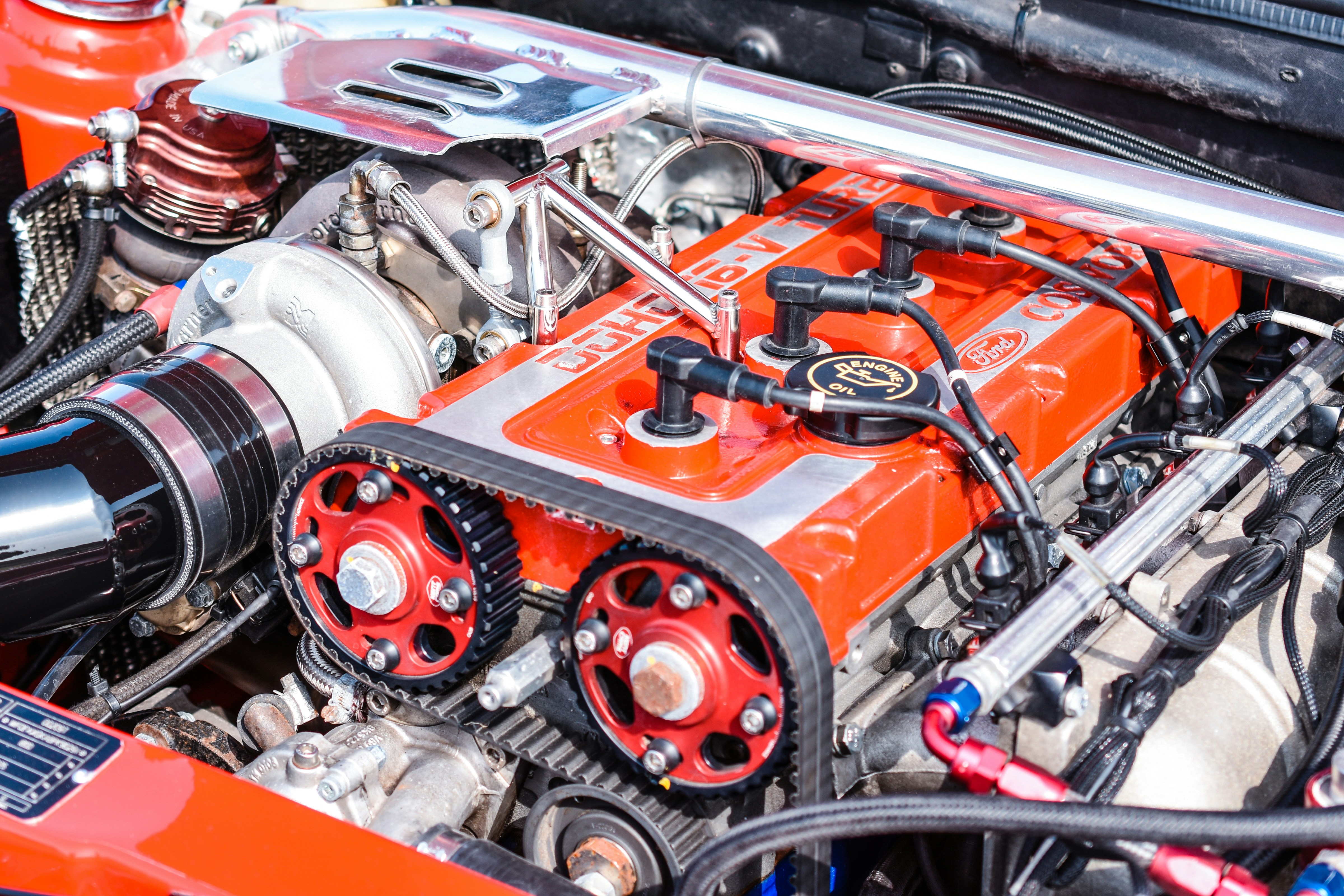 Orange and gray engine bay photo – Free Engine Image on Unsplash