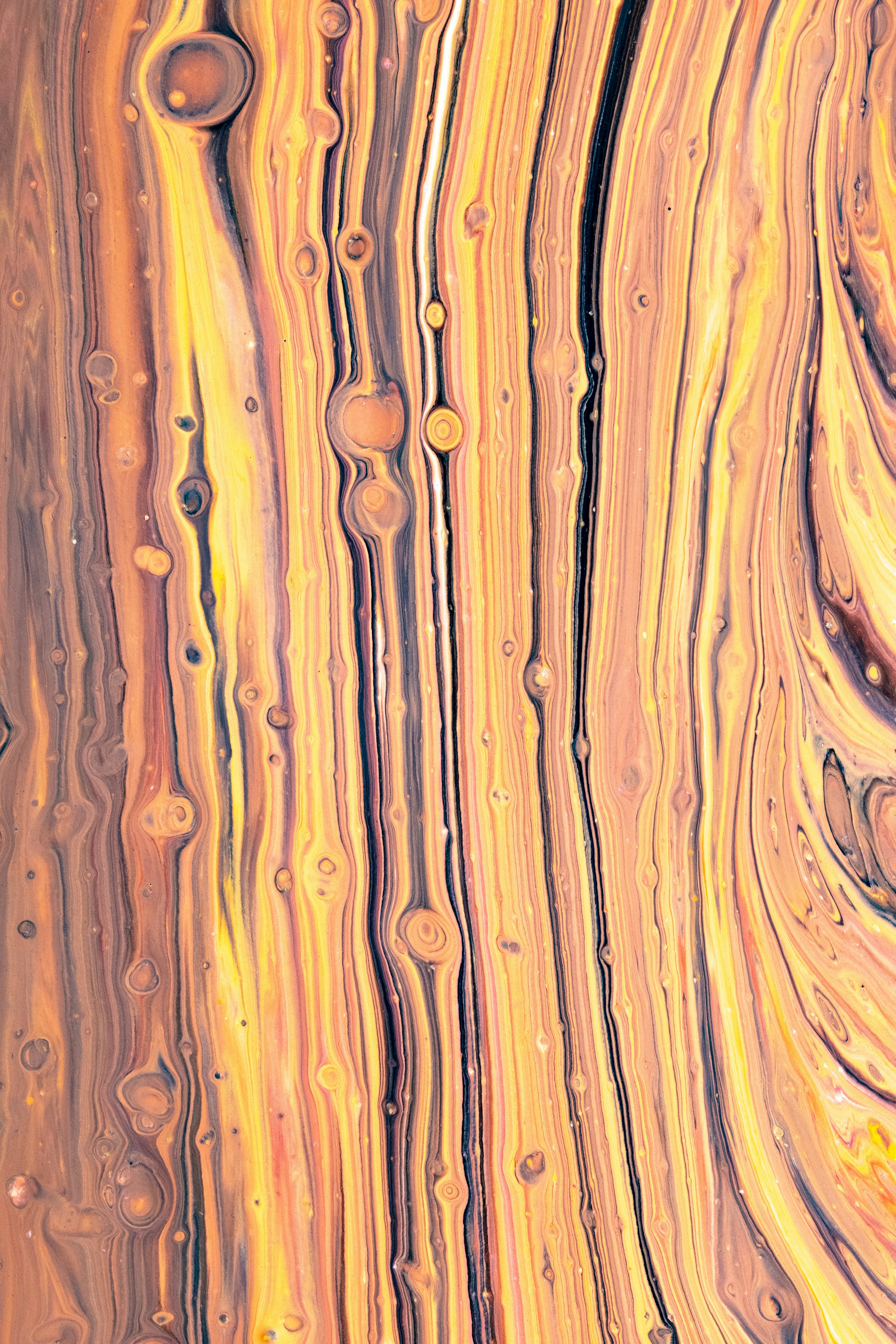 Abstract swirling patterns of vibrant colors with smooth gradients and circular formations. This artwork captures the essence of fluidity and motion.