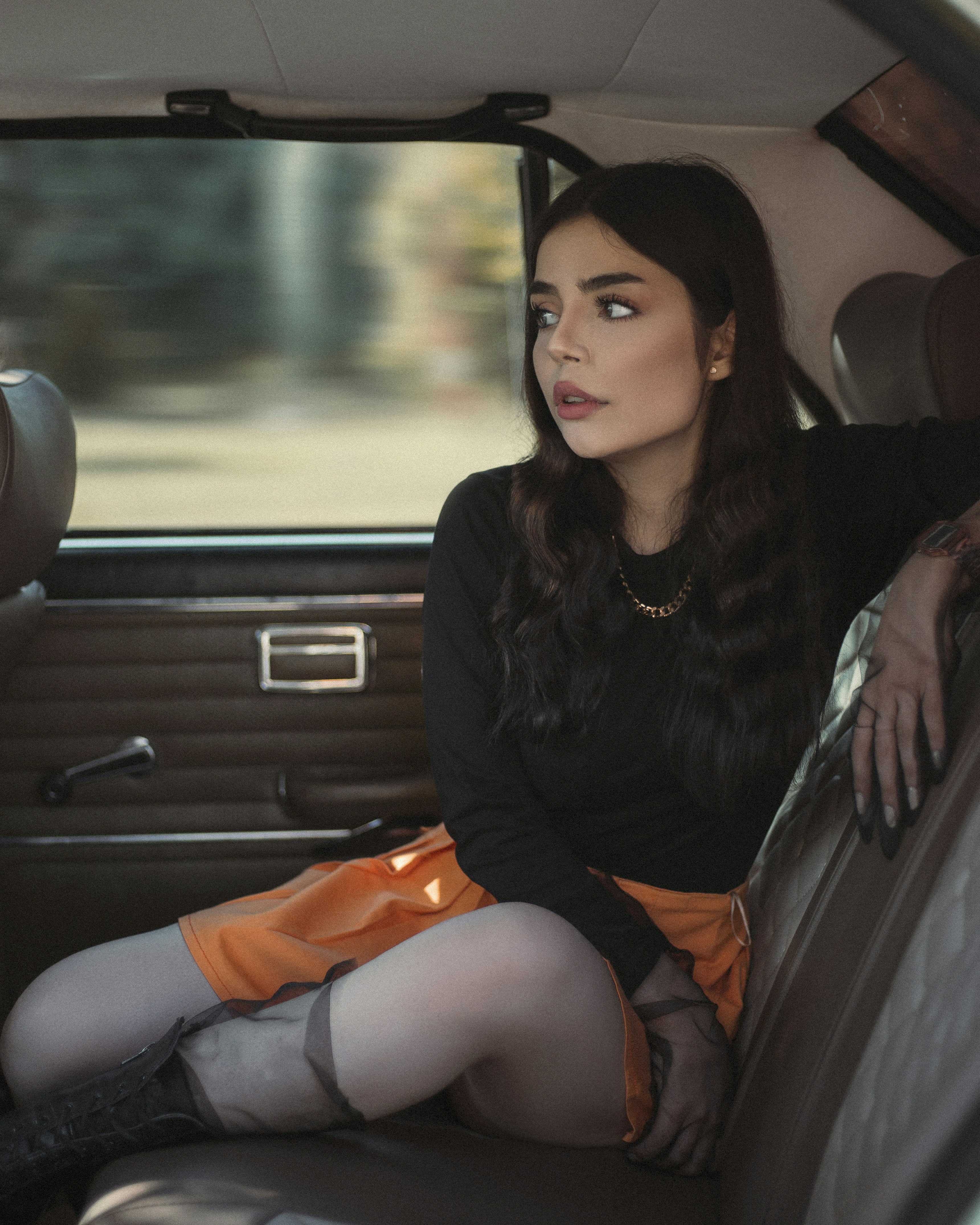 Quiet Confidence in the Car: A Portrait with Velvet Night Tones