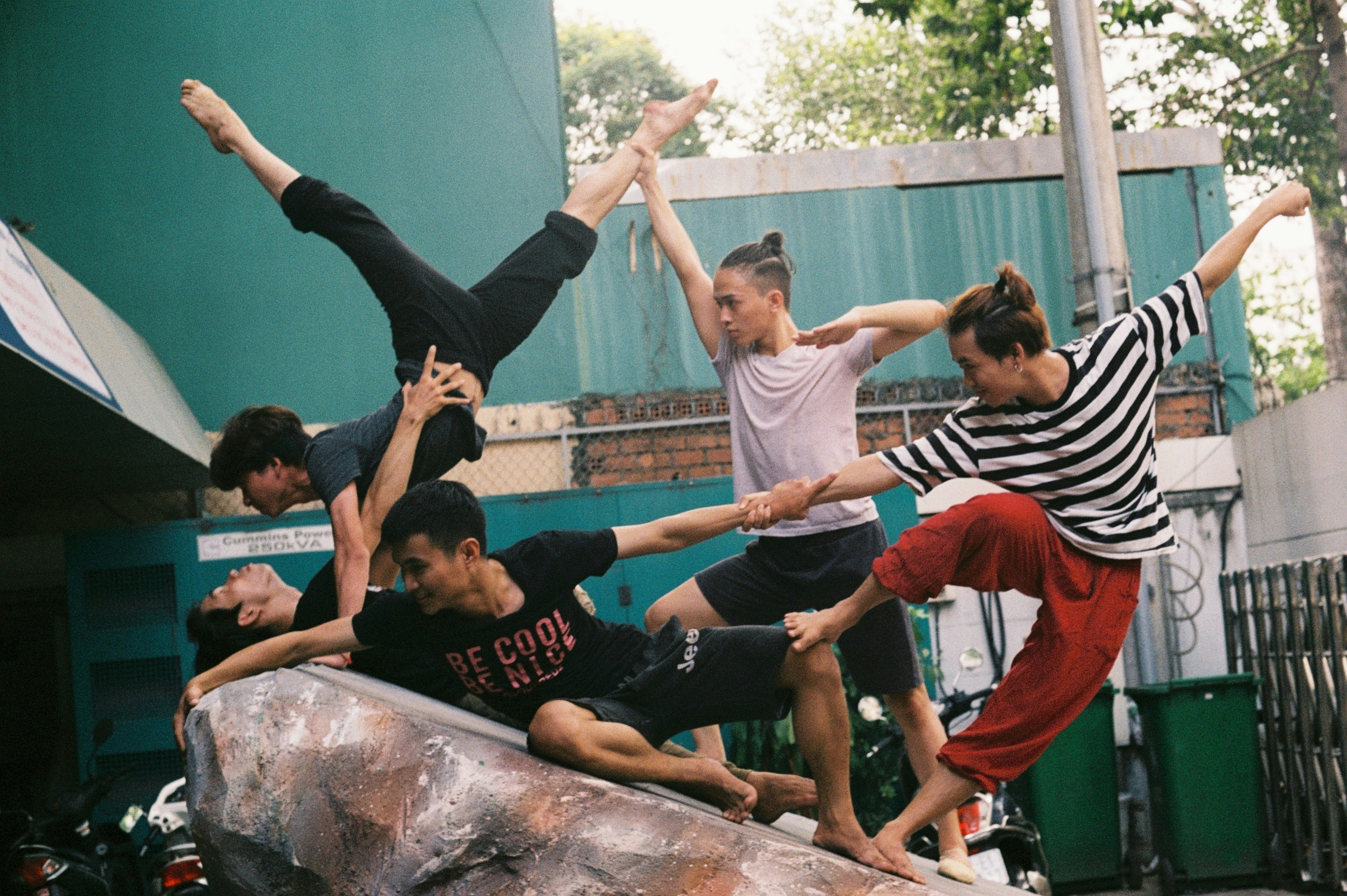 Man in white crew neck t-shirt and black shorts jumping on air during ...