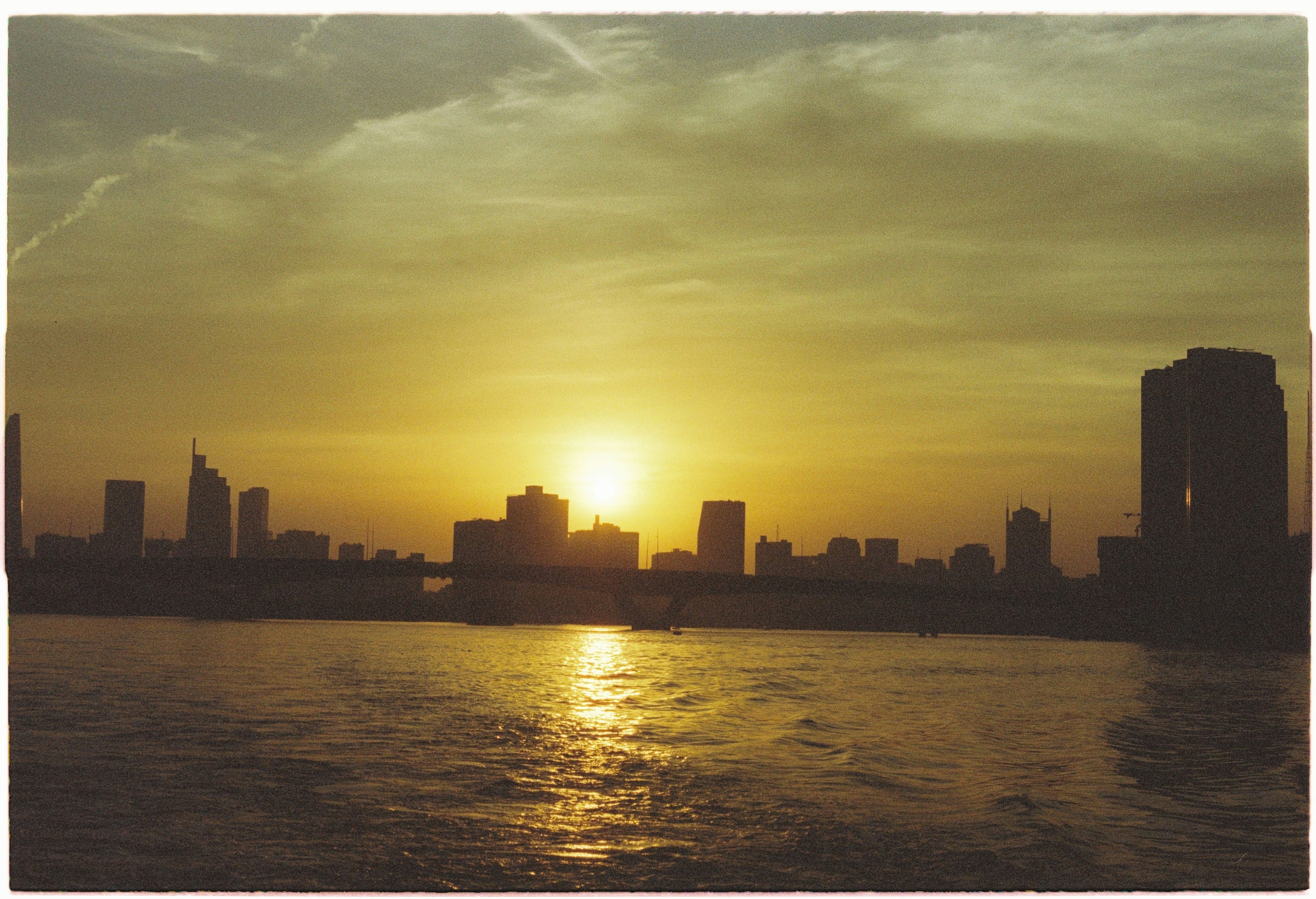 Golden Horizon Over Urban Silhouette