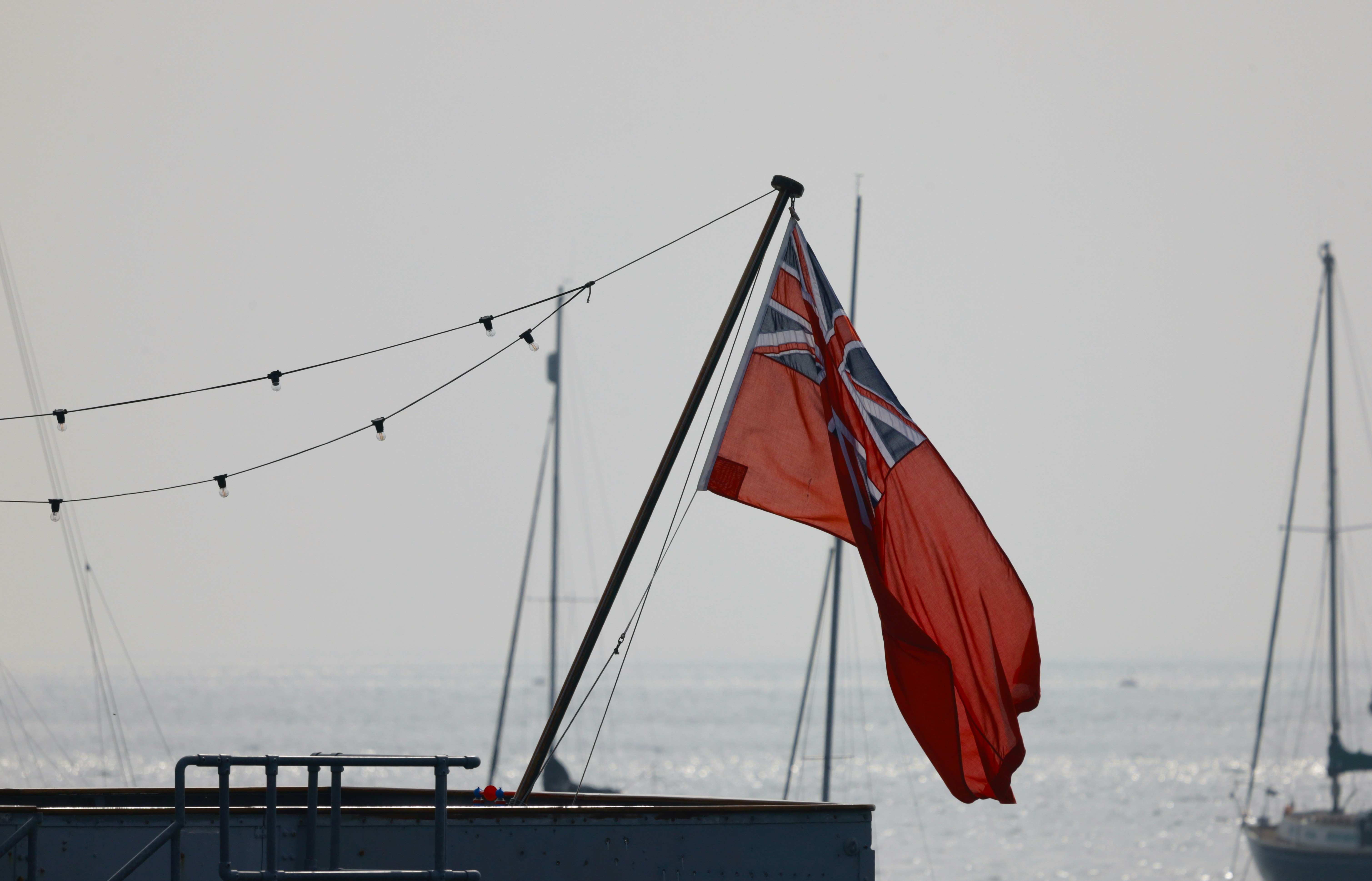 Nautical Serenity: A Red Ensign at Rest