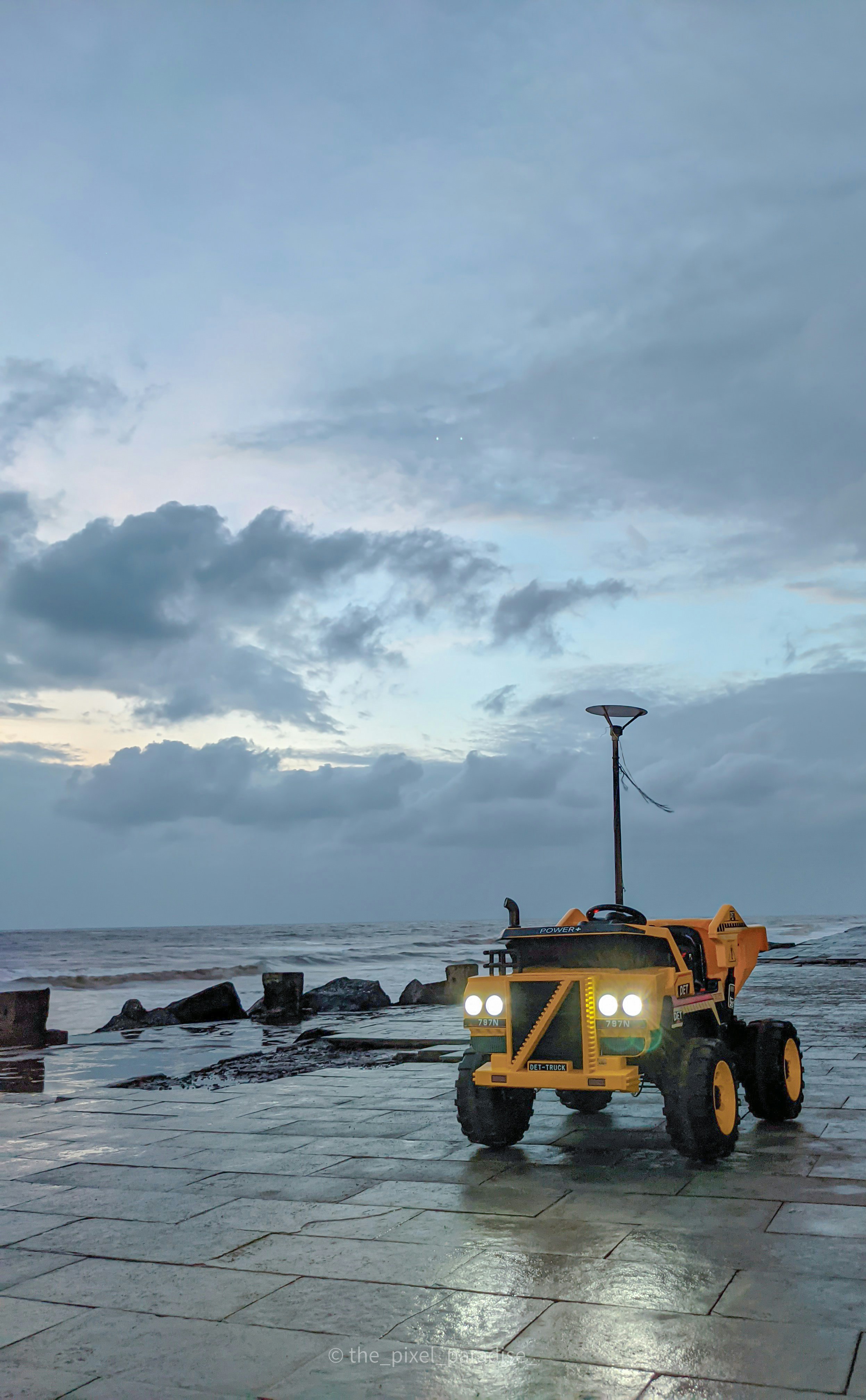 Yellow Tugboat on a Stormy Promenade