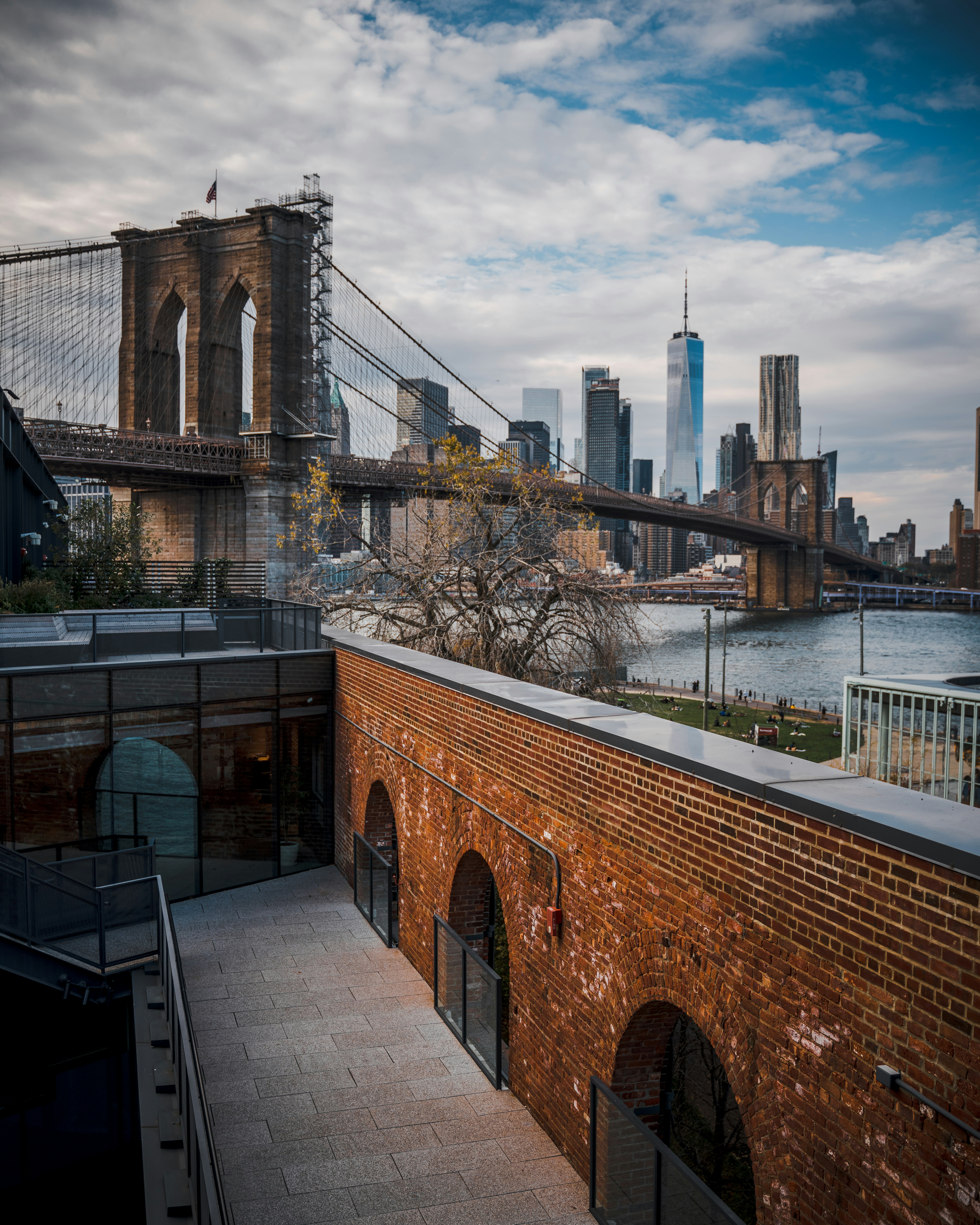 Riverside Brick Wall Framing Brooklyn Bridge and the Manhattan Skyline