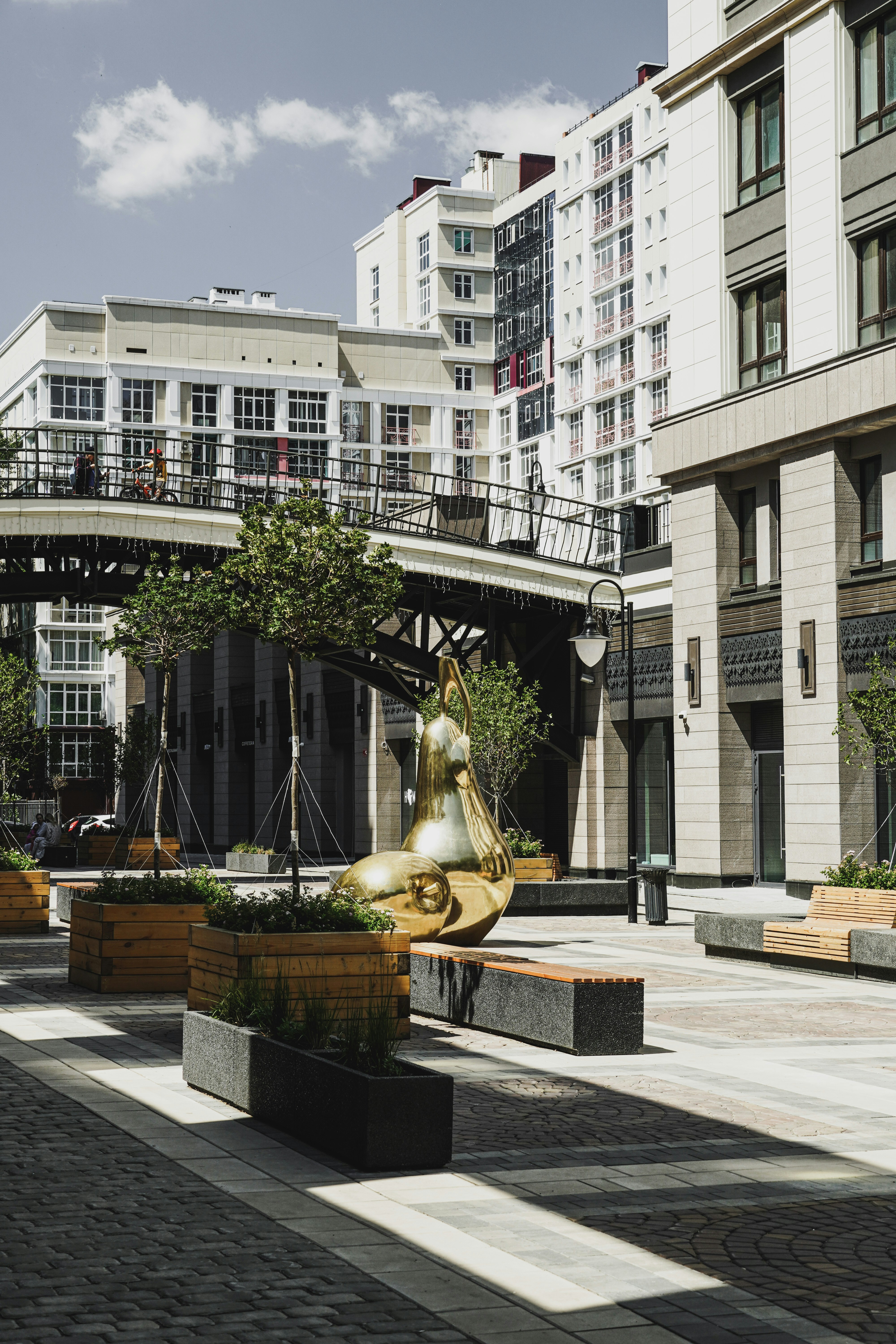 Golden Goose in the Courtyard: A Quiet Moment Between Architecture and Sky