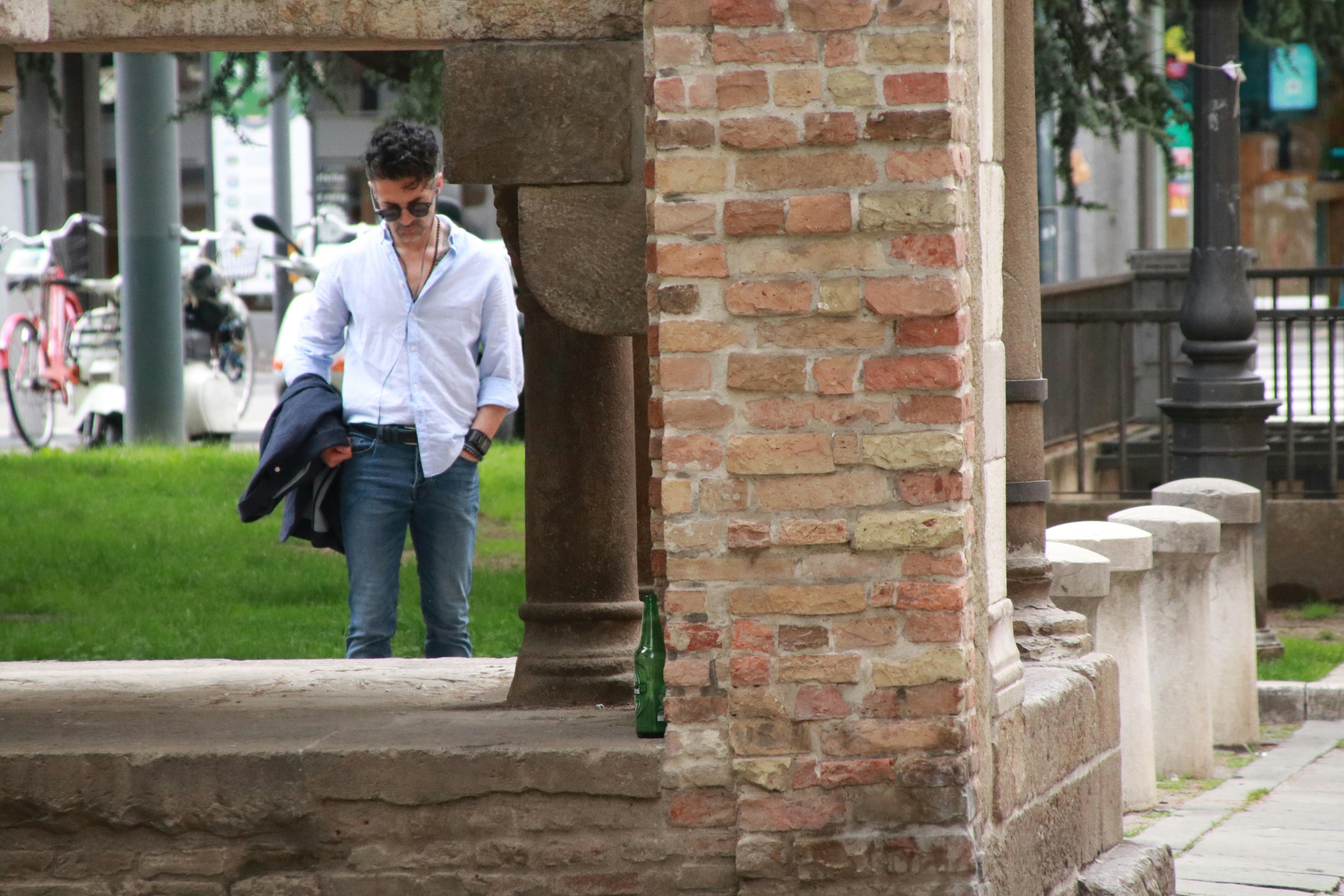 Casual Portrait in a Brick-Archway Alley