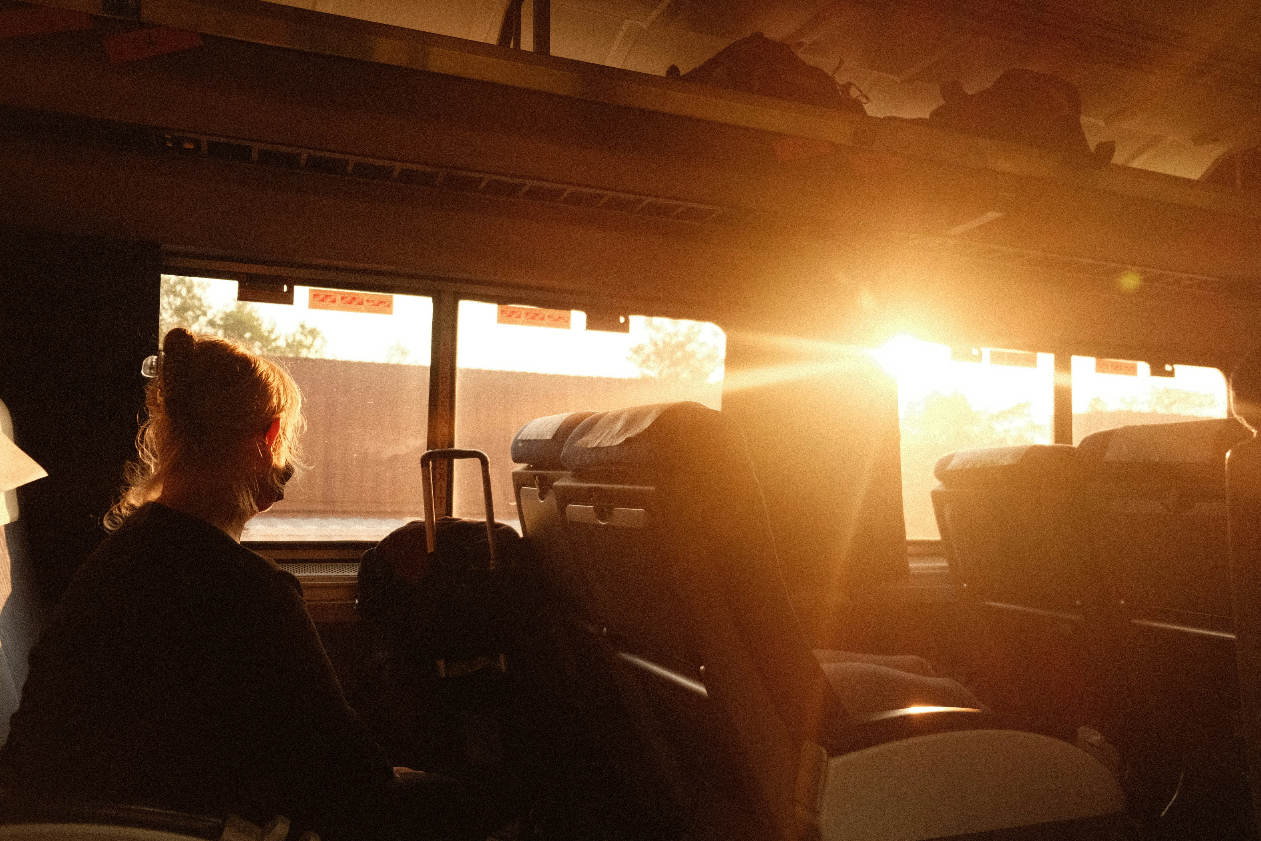 Amber Sunlight Through an Idle Bus Aisle