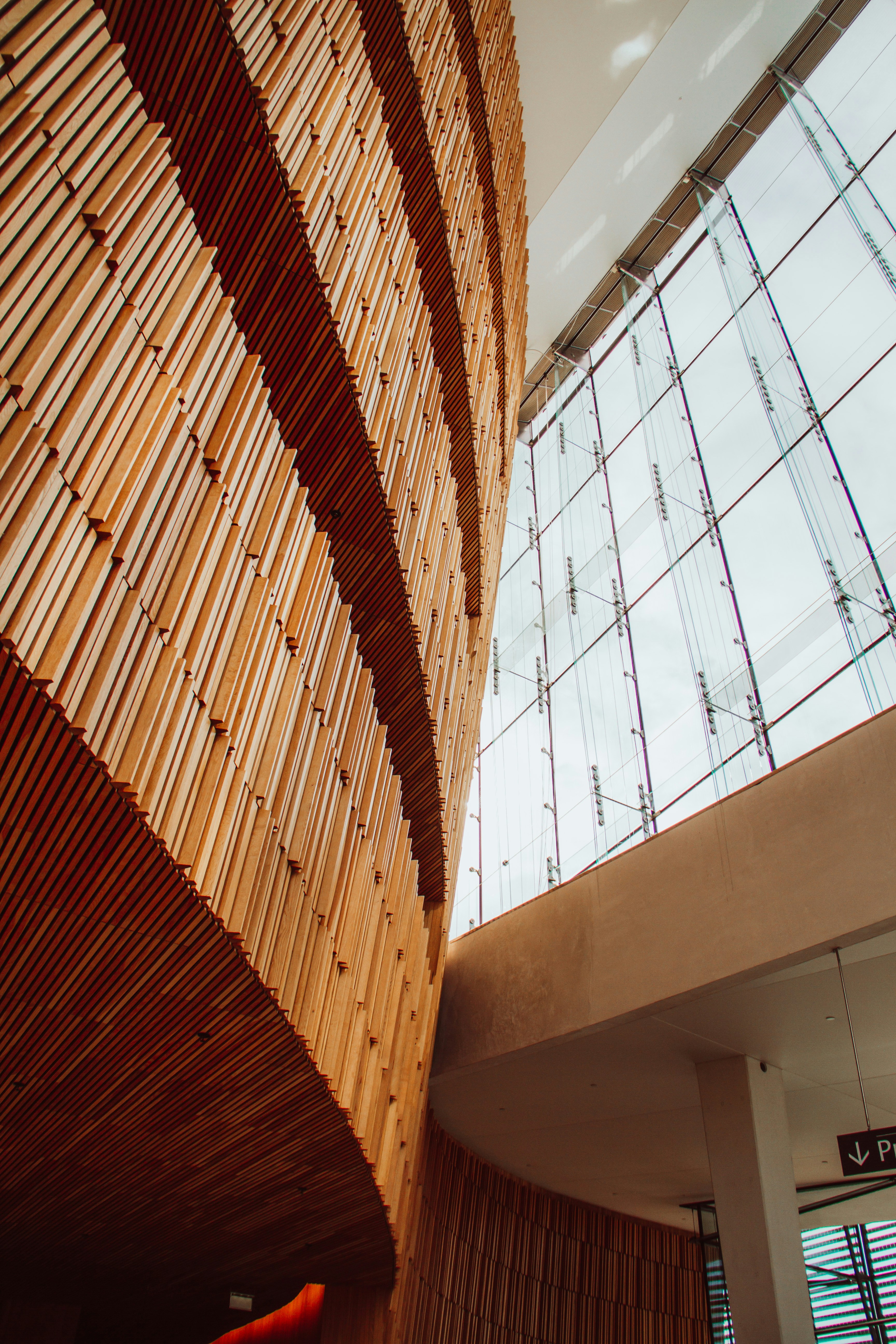 A large wooden structure with a skylight above it photo – Free Building ...