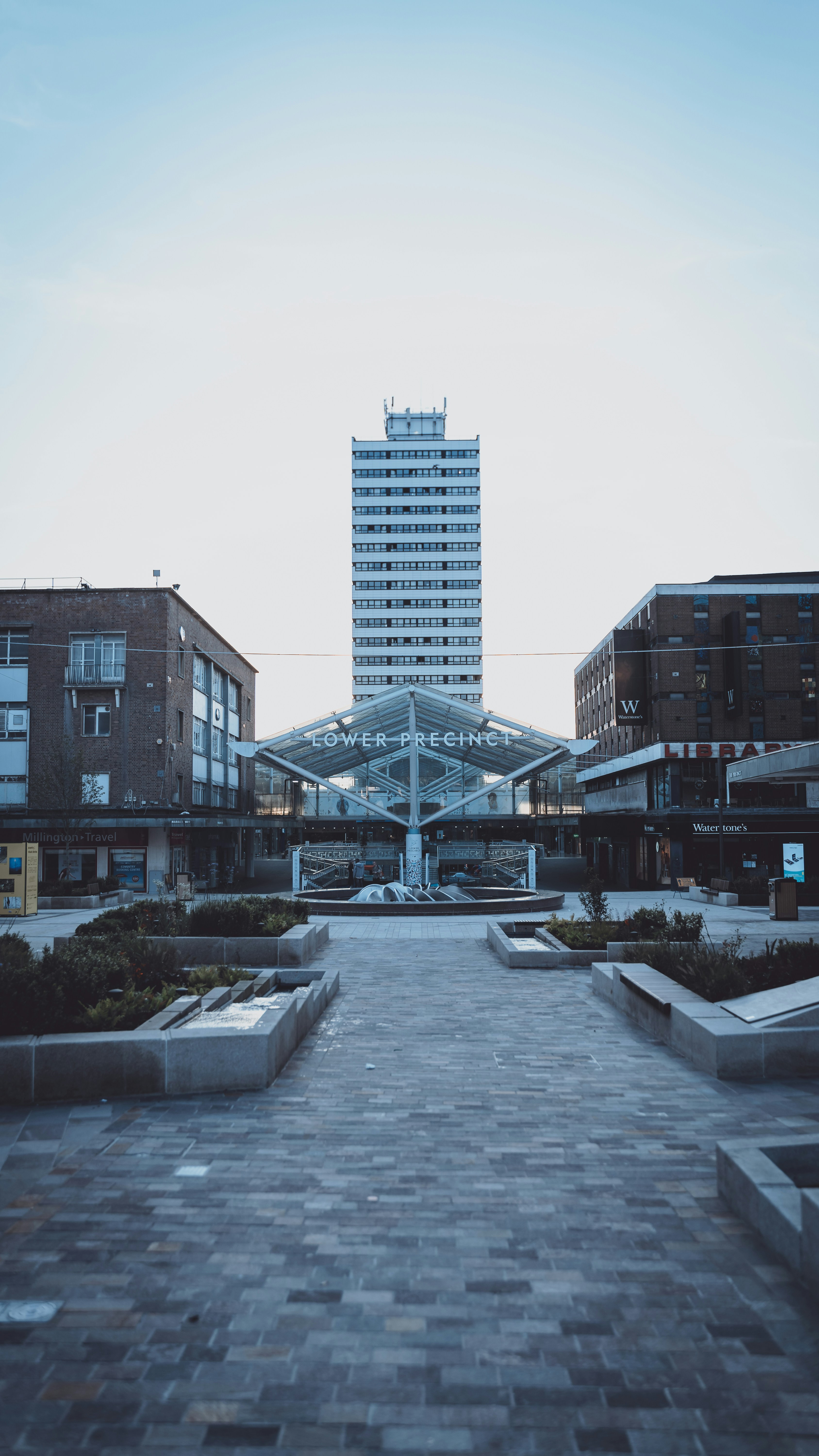 The changing face of Lower Preceinct Shopping Area - City Centre | brown concrete building near body of water during daytime