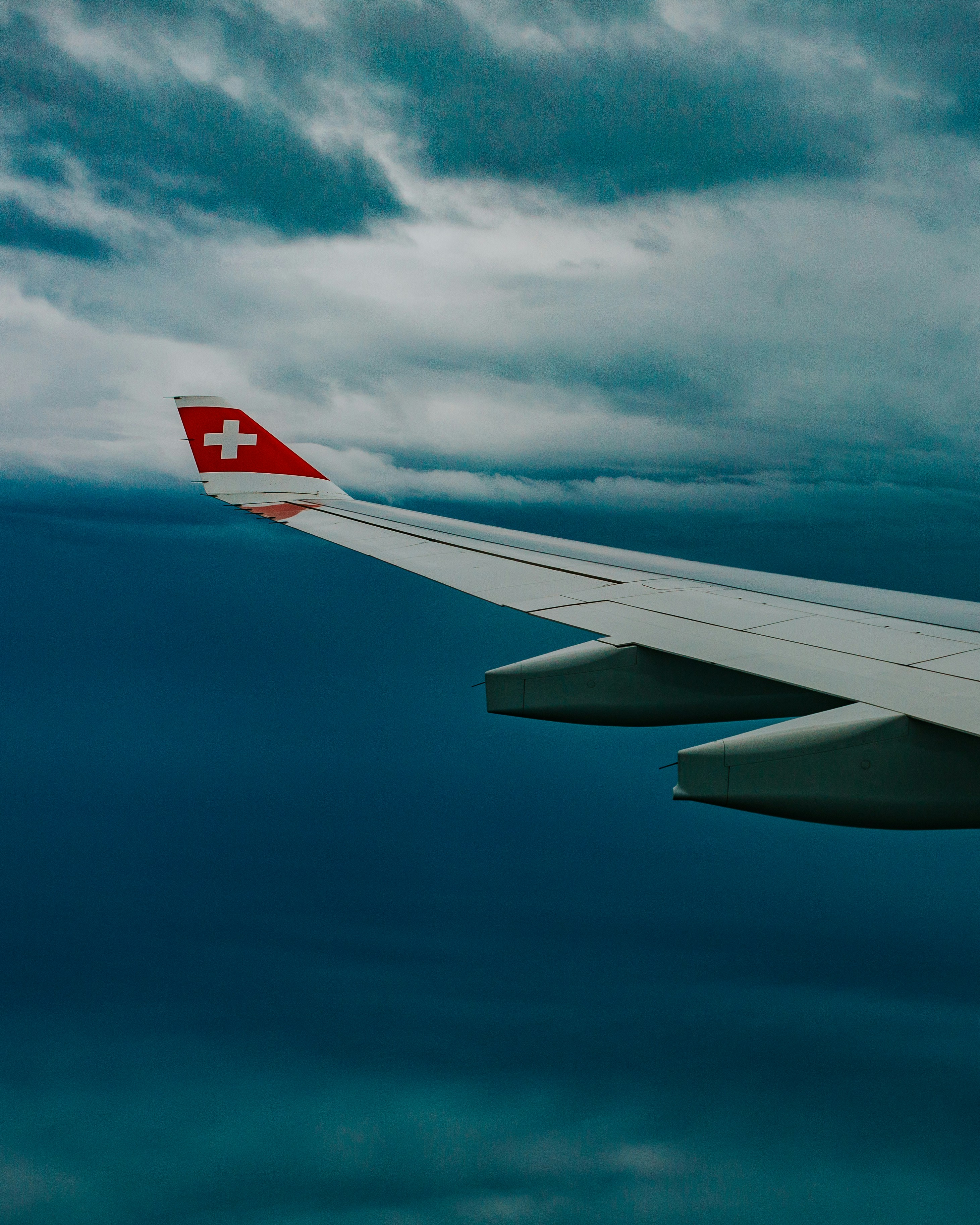 White and red airplane wing under blue sky during daytime photo – Free ...