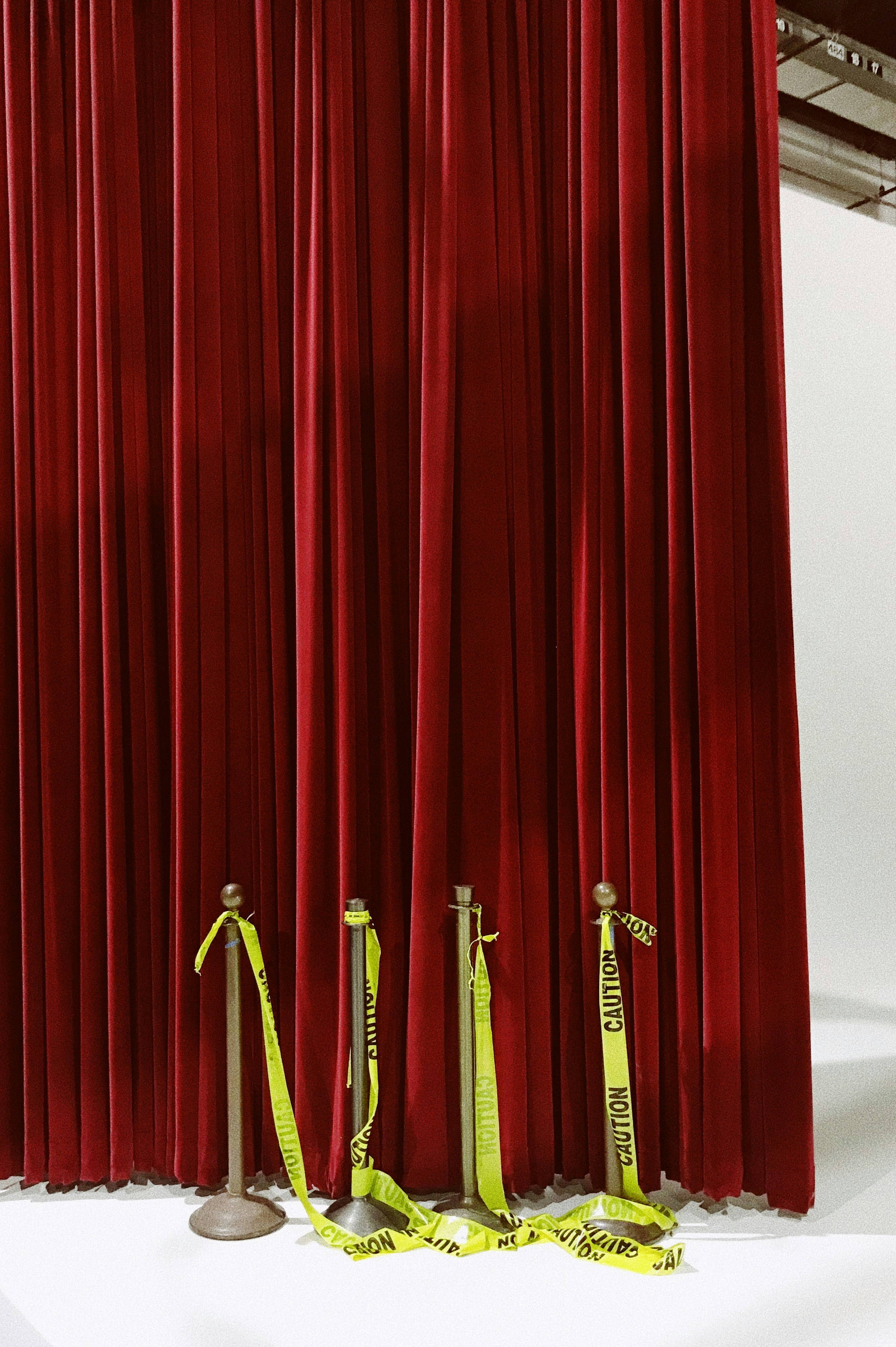 Curtain Closure: Yellow Tape Markers at Stage Threshold