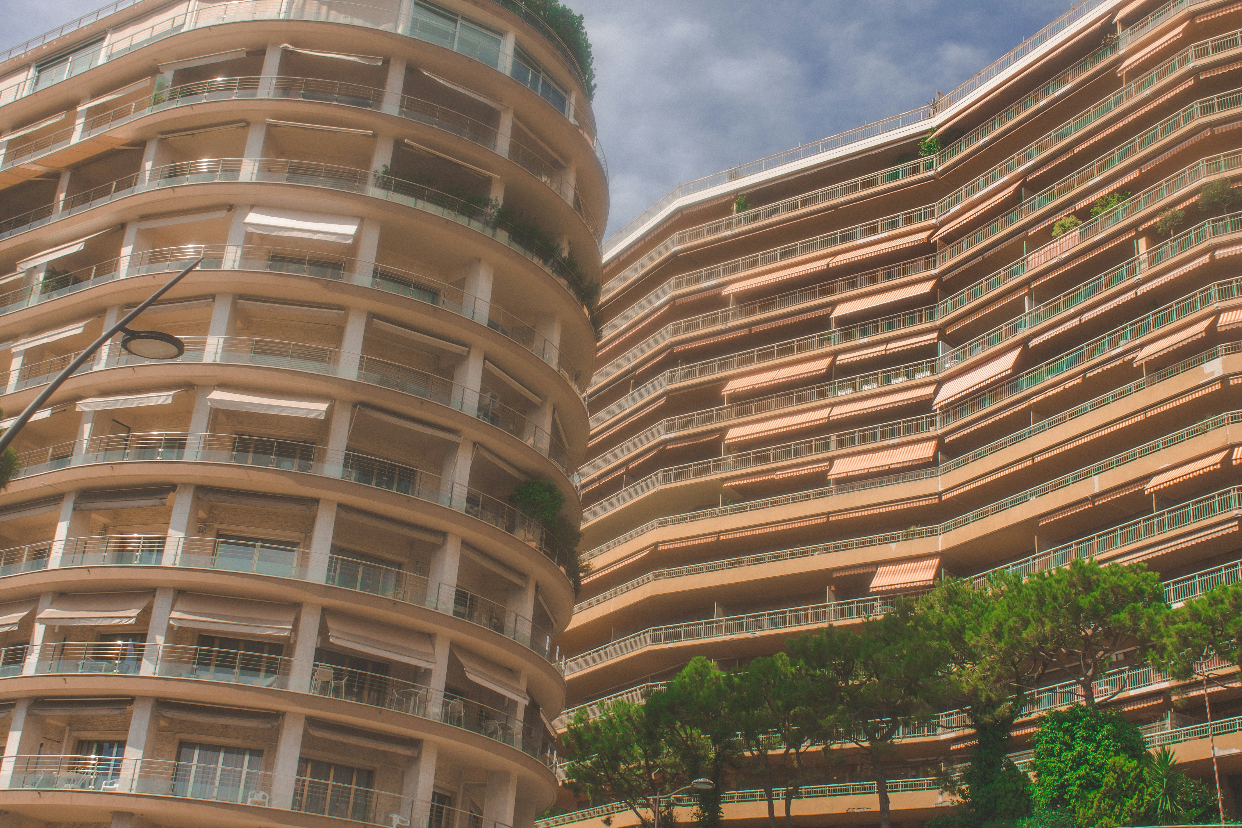 Crescent Facades: Warm Light Illuminates Twin Curved Towers