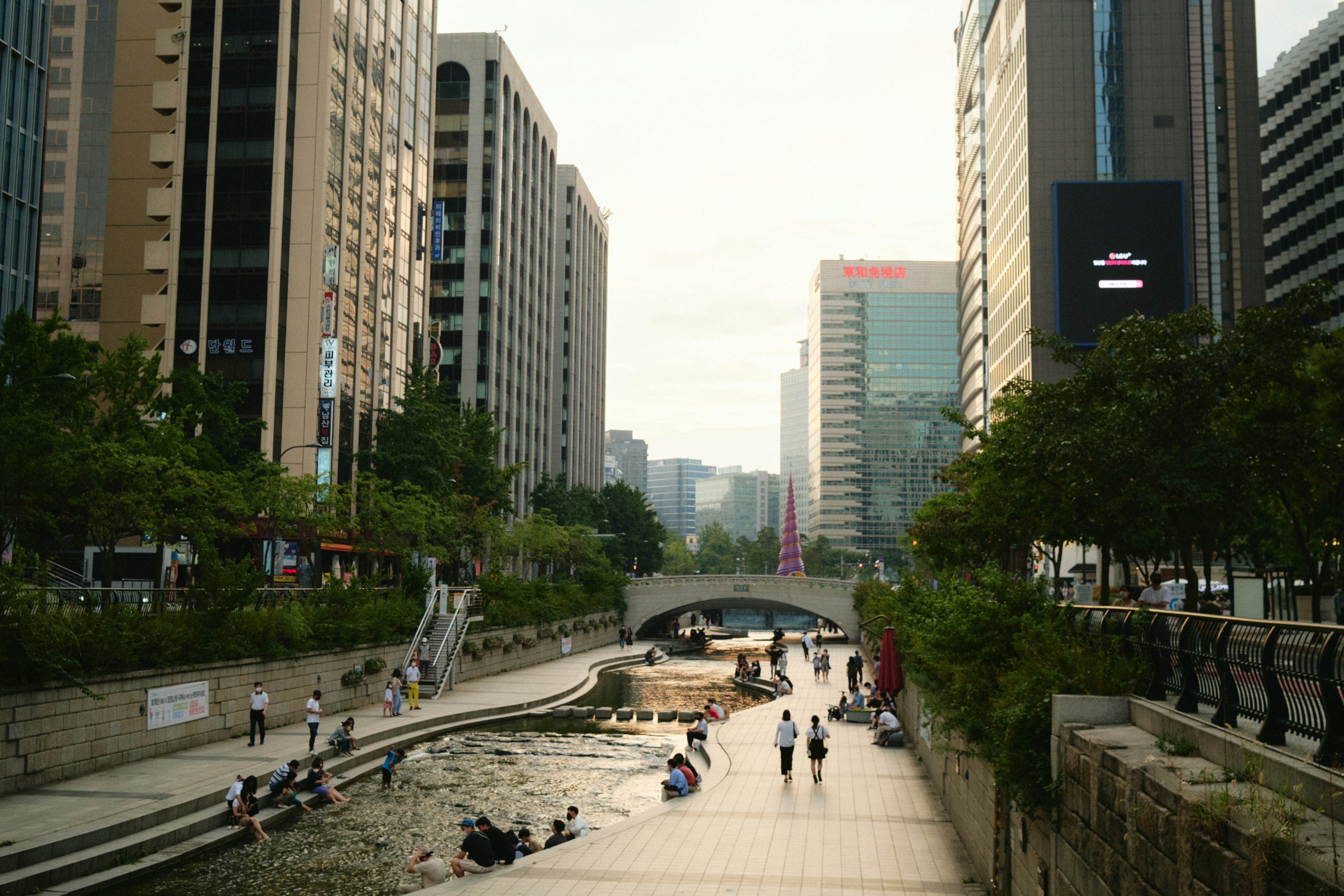 Cheonggyecheon is a 5.8 km creek flowing East to West through downtown Seoul.