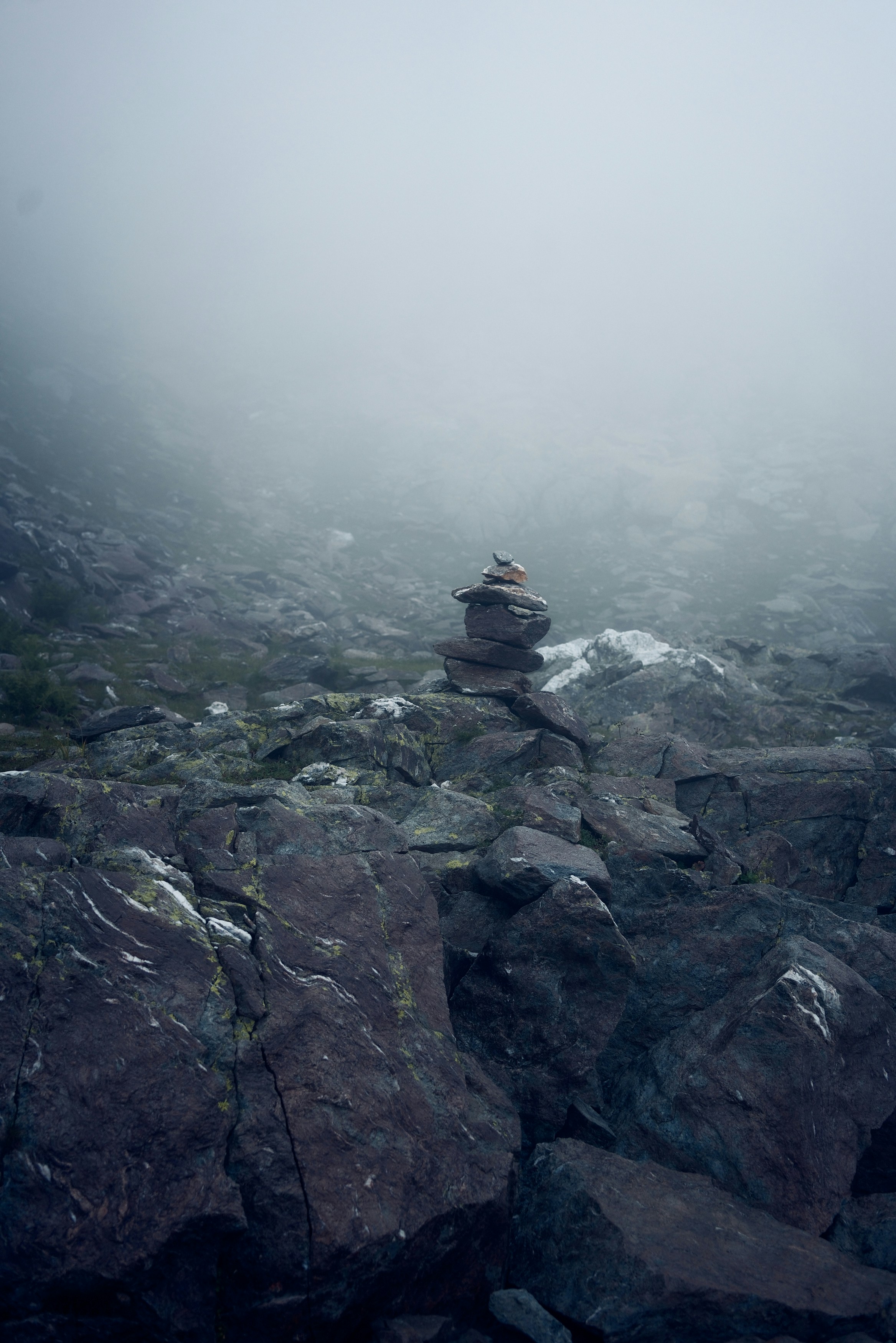 Person sitting on rock formation during daytime photo – Free Nature ...