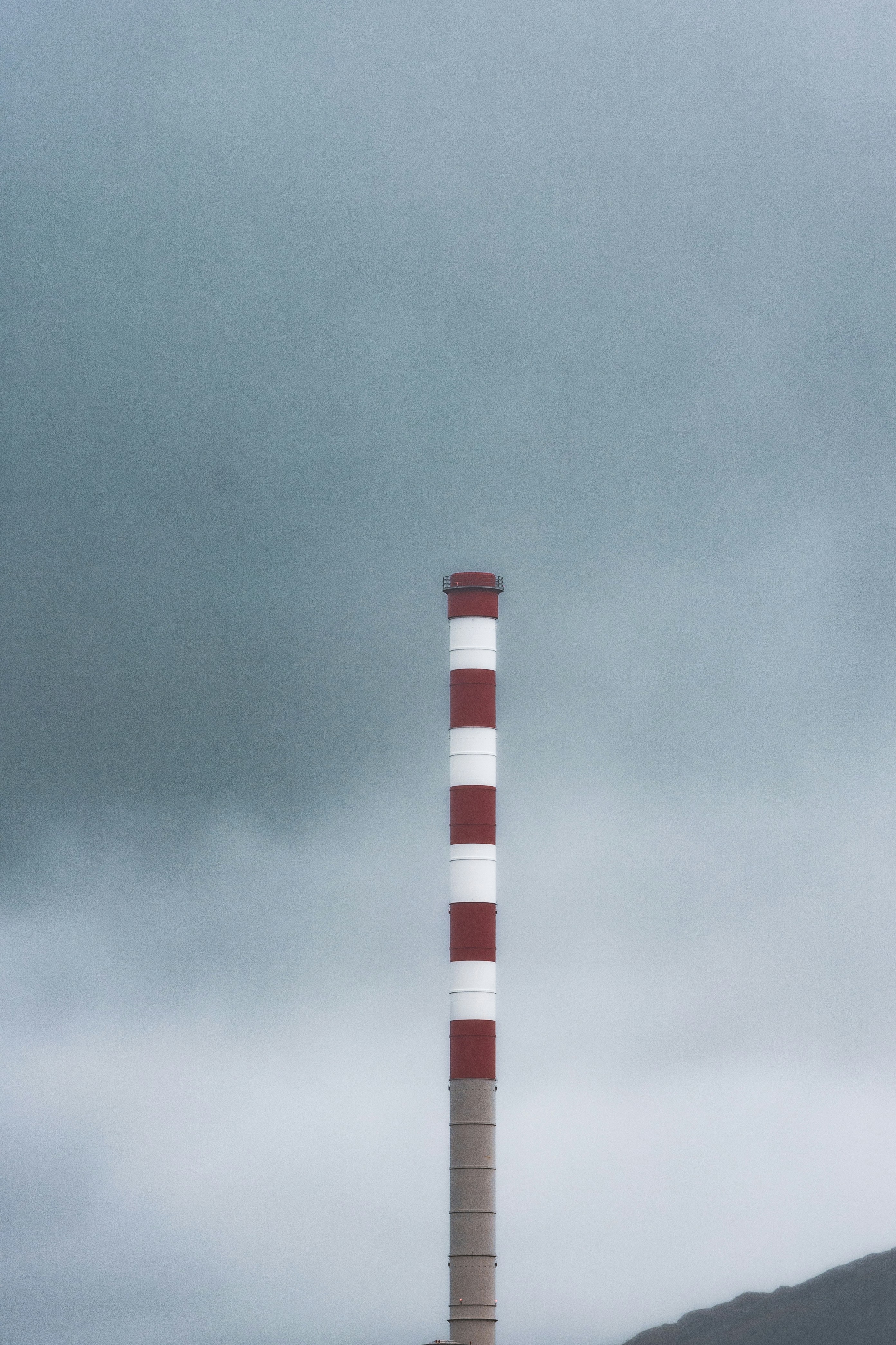 Red and white striped post under gray sky photo – Free Grey Image on ...
