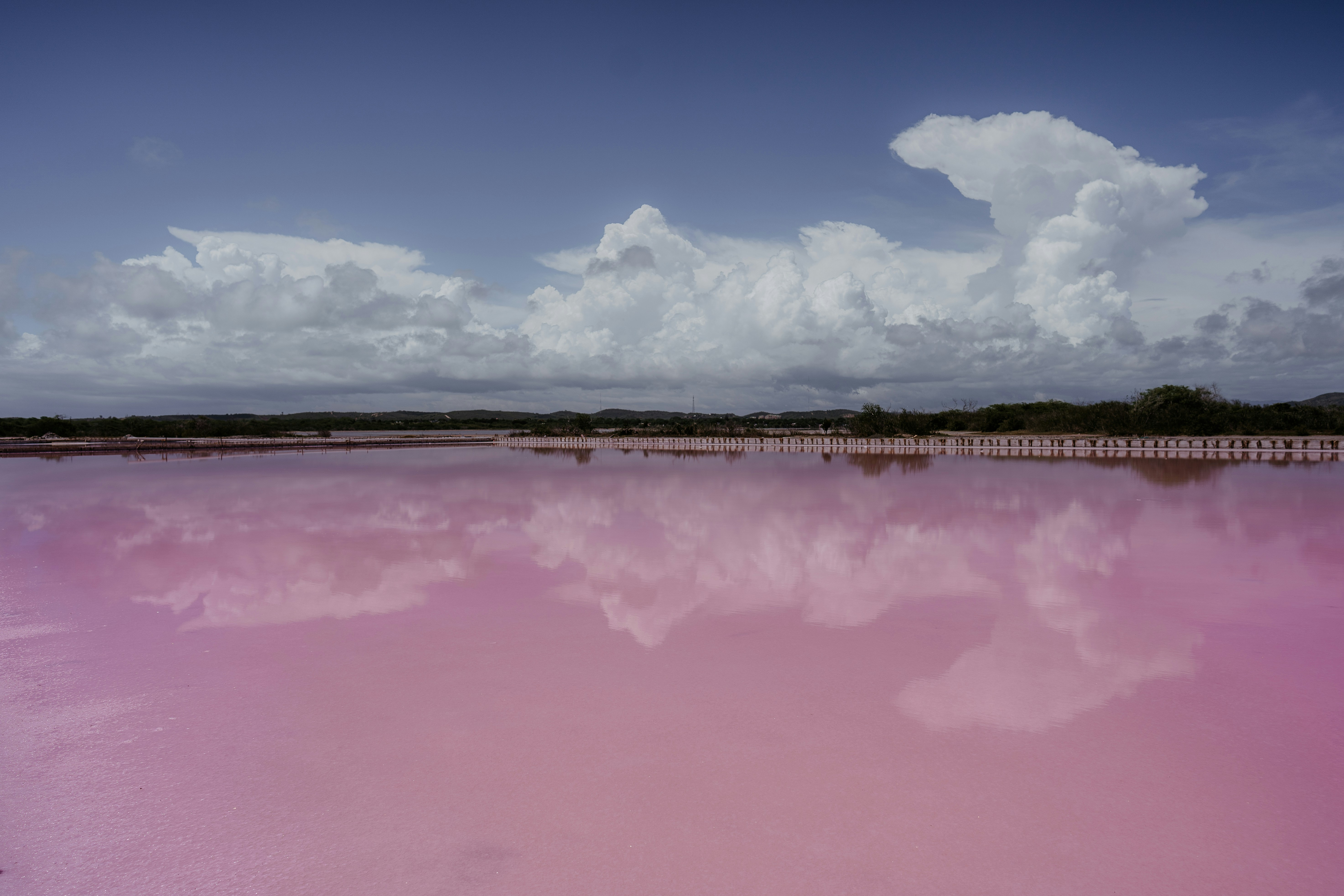 Pink Salt Lagoon under a Cloud-Washed Sky