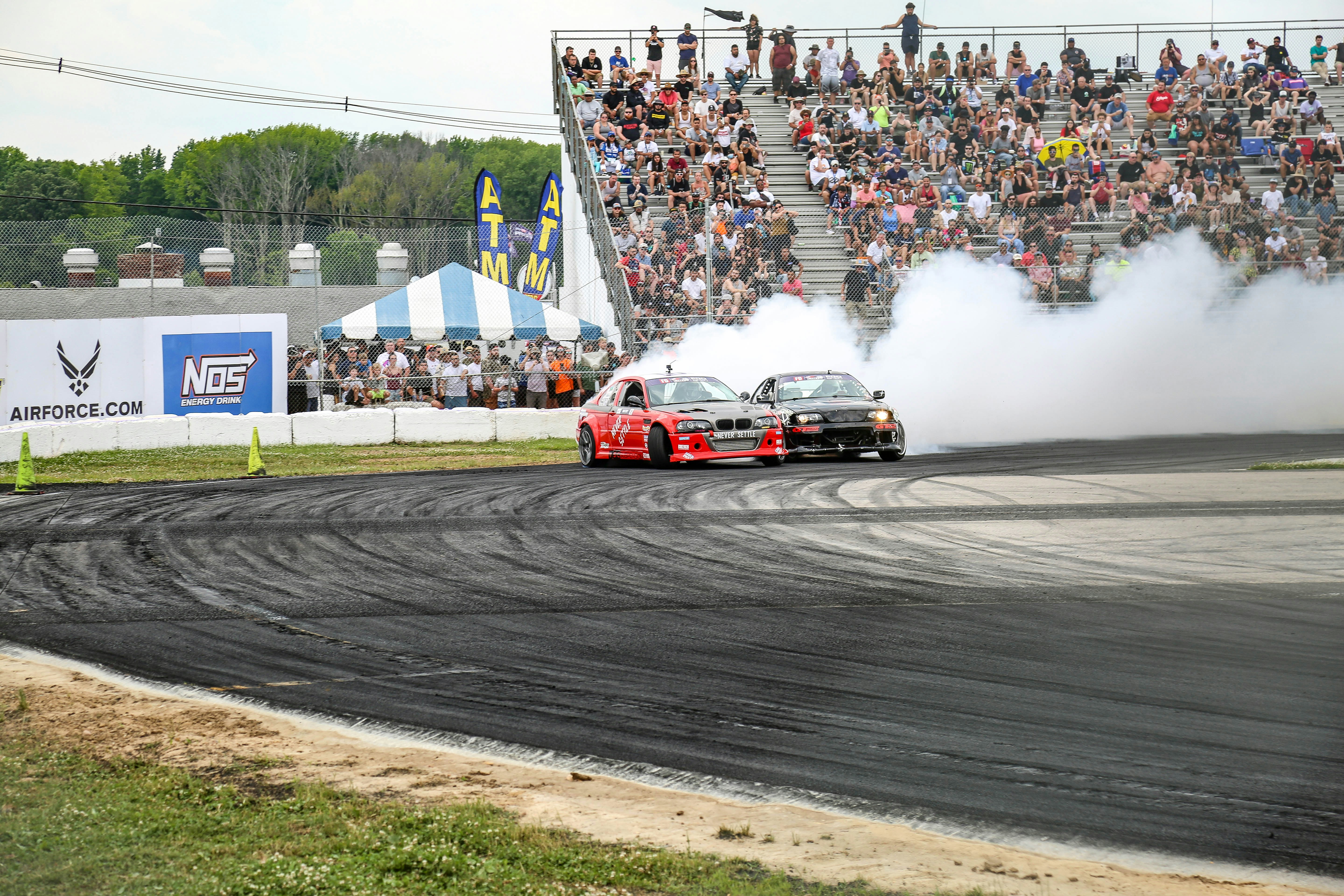 Red and white racing car on track during daytime photo – Free Usa Image ...