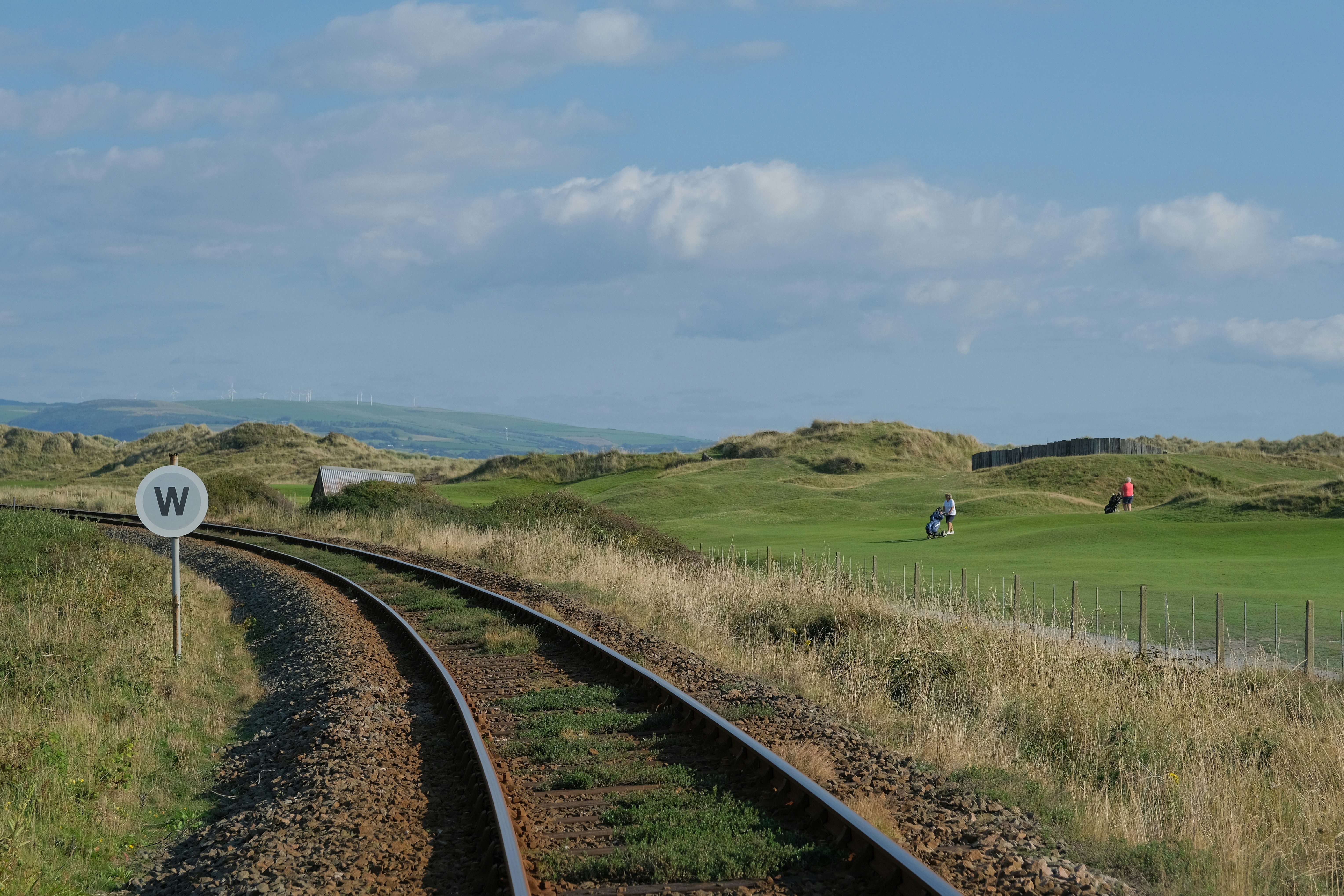 Curved Rails to the Green: A Coastal Landscape at Distant Convergence