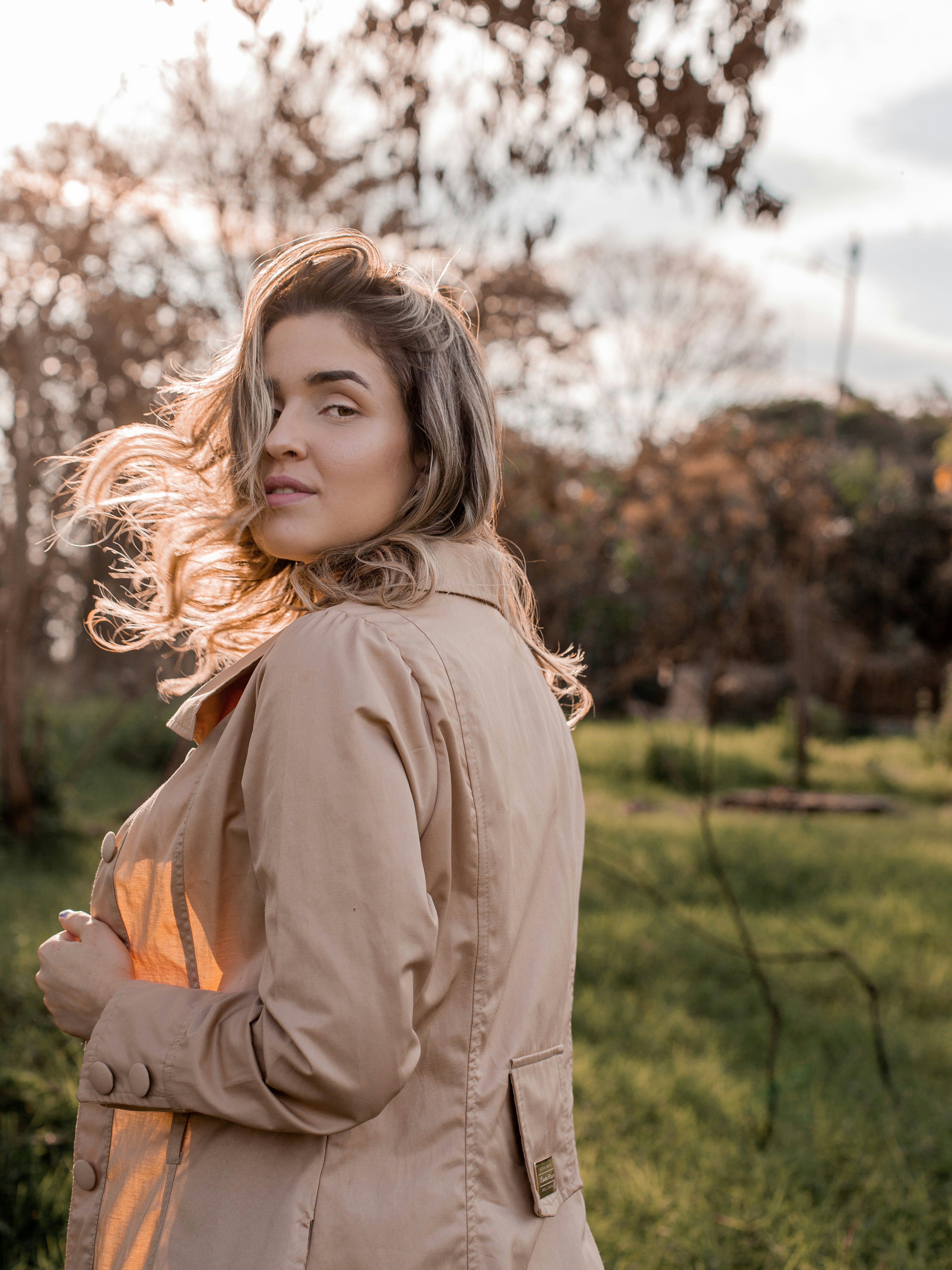 Autumn Light Portrait: Wind, Hair, and Golden Field