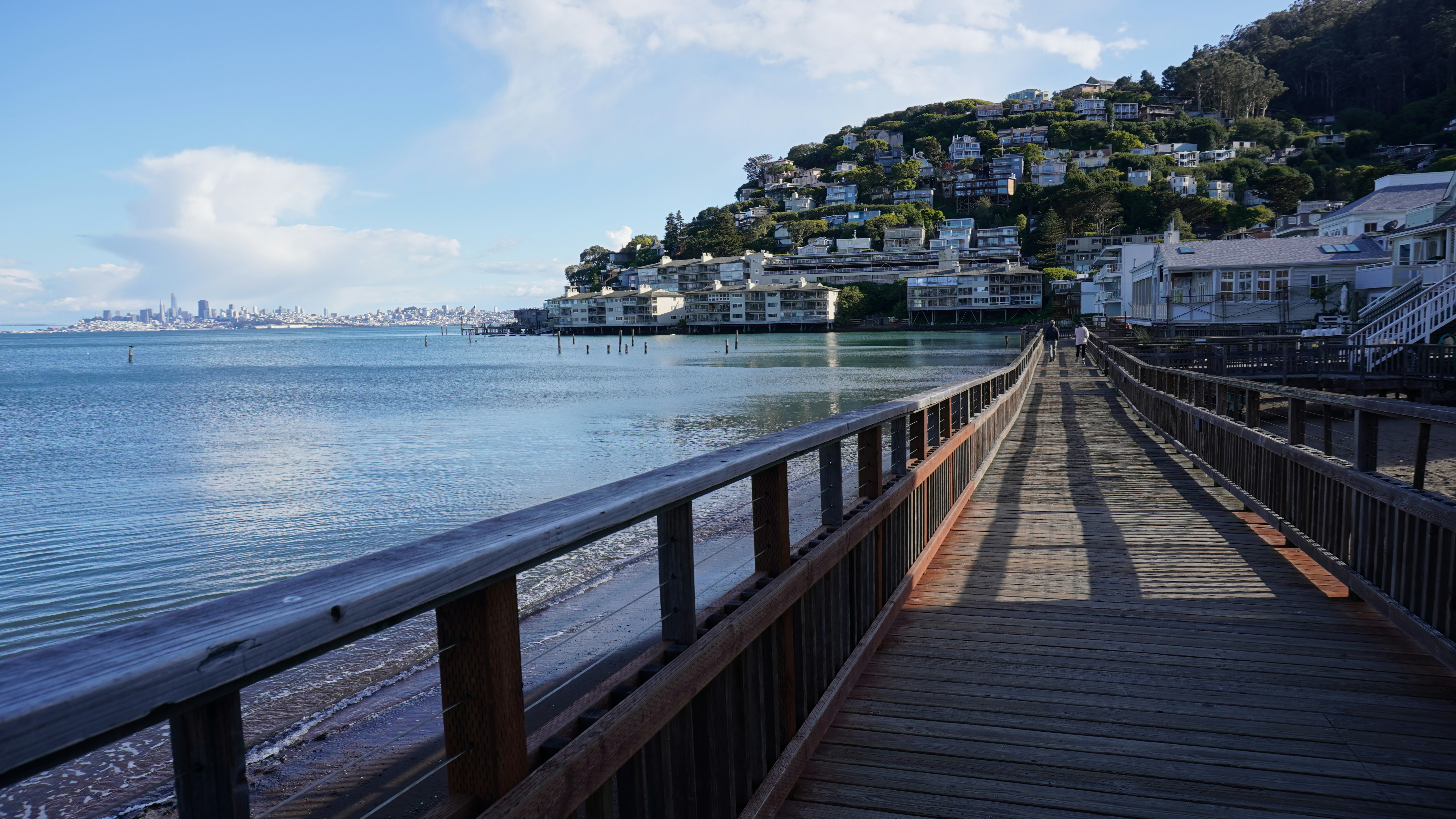 Horizon Pier: Wooden Walk Toward a Terraced Seaside Town