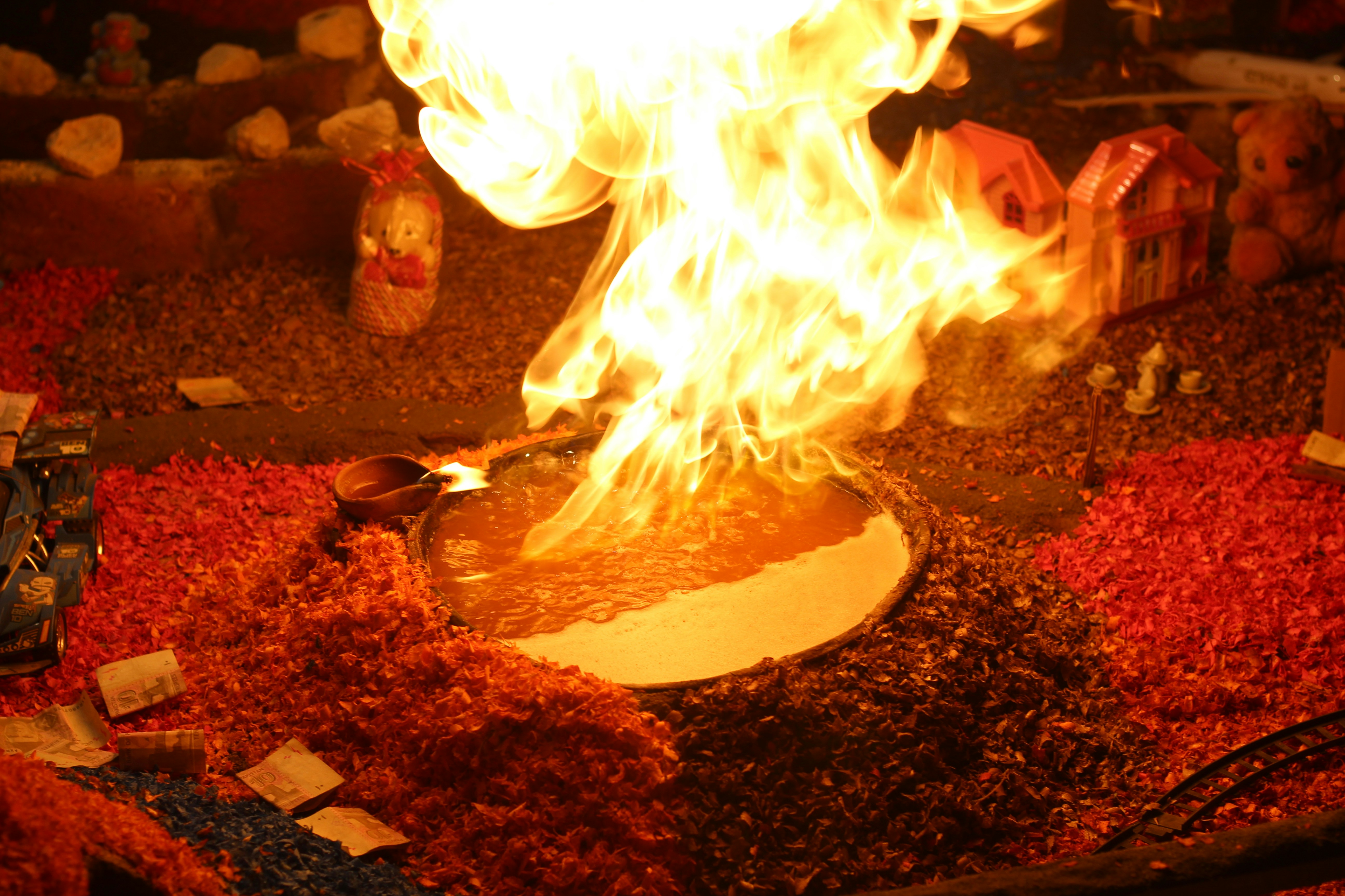 A fire burning in a bowl on top of a table photo – Free Fire Image on ...
