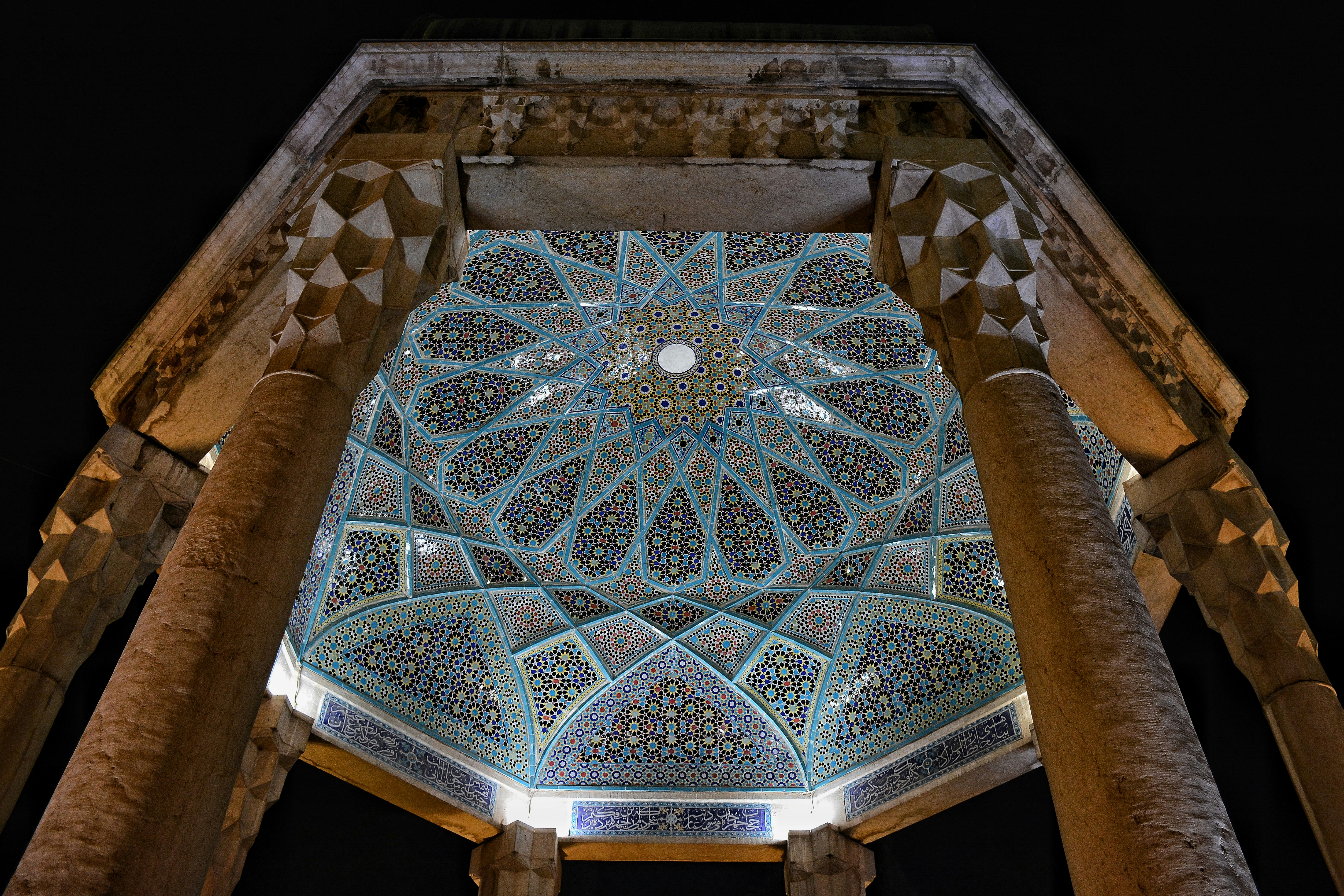 The Tomb of Hafez and its associated memorial hall, the Hāfezieh, are two memorial structures erected in the northern edge of Shiraz, Iran, in memory of the celebrated Persian poet Hafez.
. | brown and blue floral ceiling