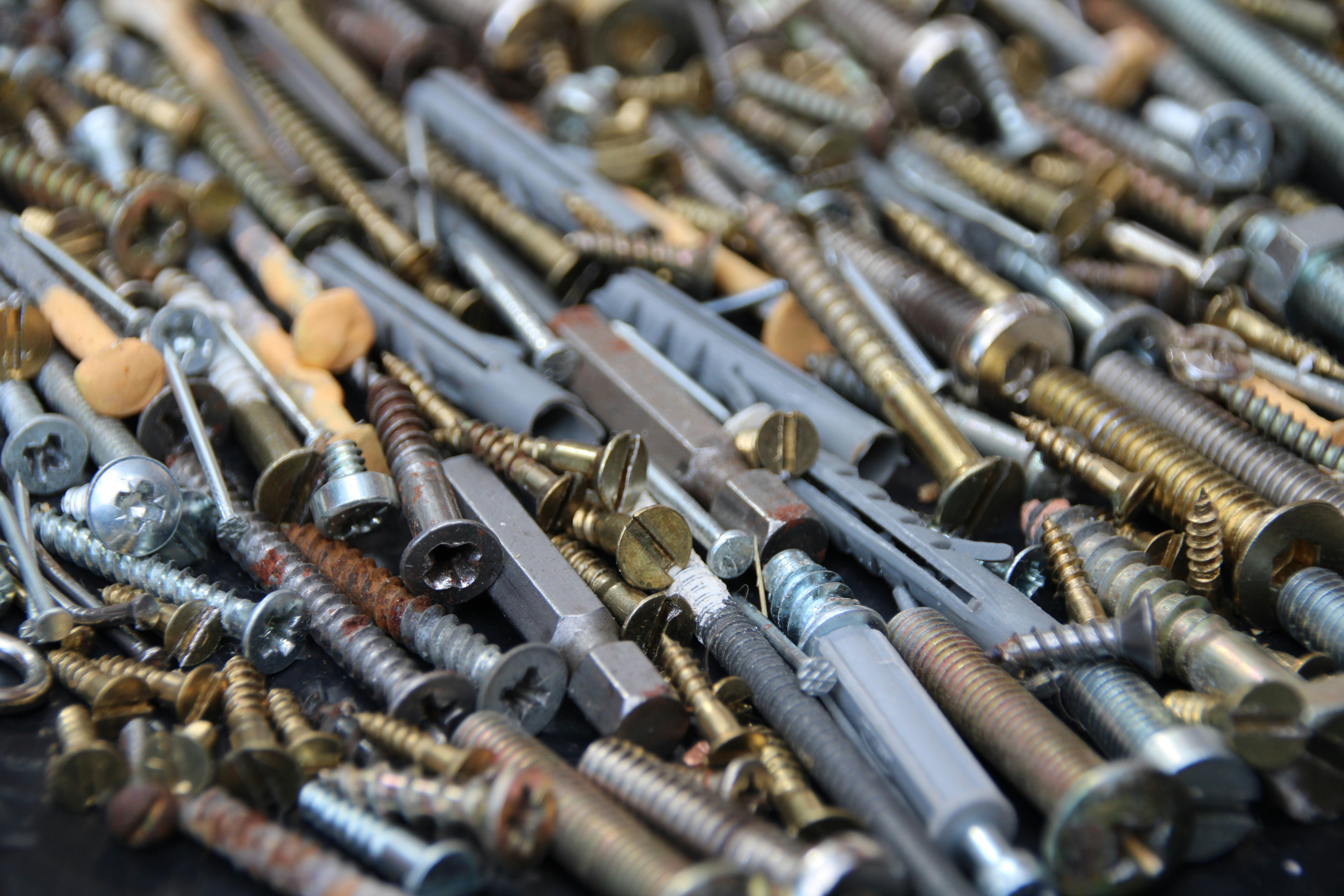 Silver and gold round coins photo – Free Screws Image on Unsplash