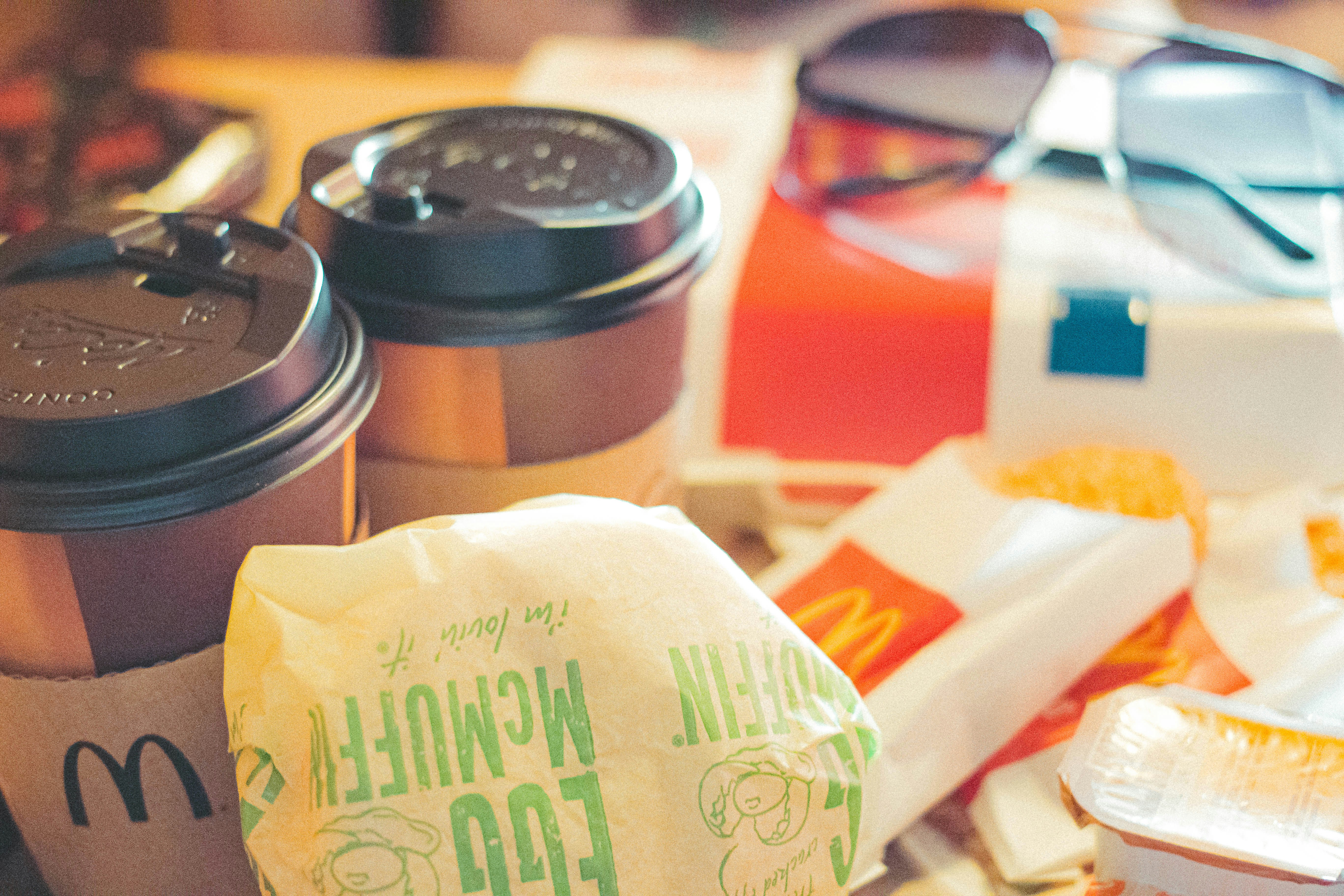 Morning Convenience: A Cluttered McDonald's Breakfast Spread