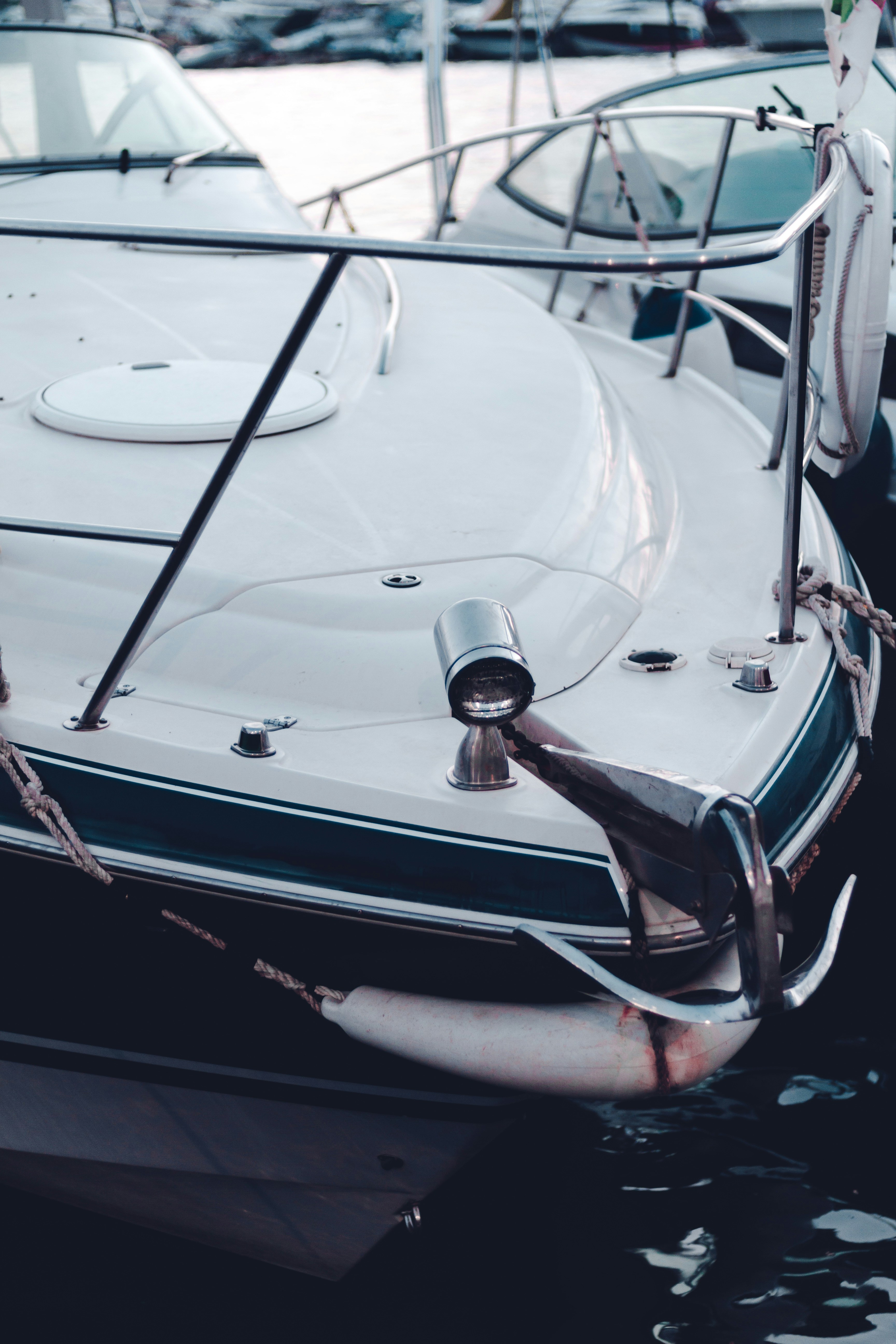 Bowlight at the Marina: A Close-Up on a Moored Yacht's Gleaming Foredeck