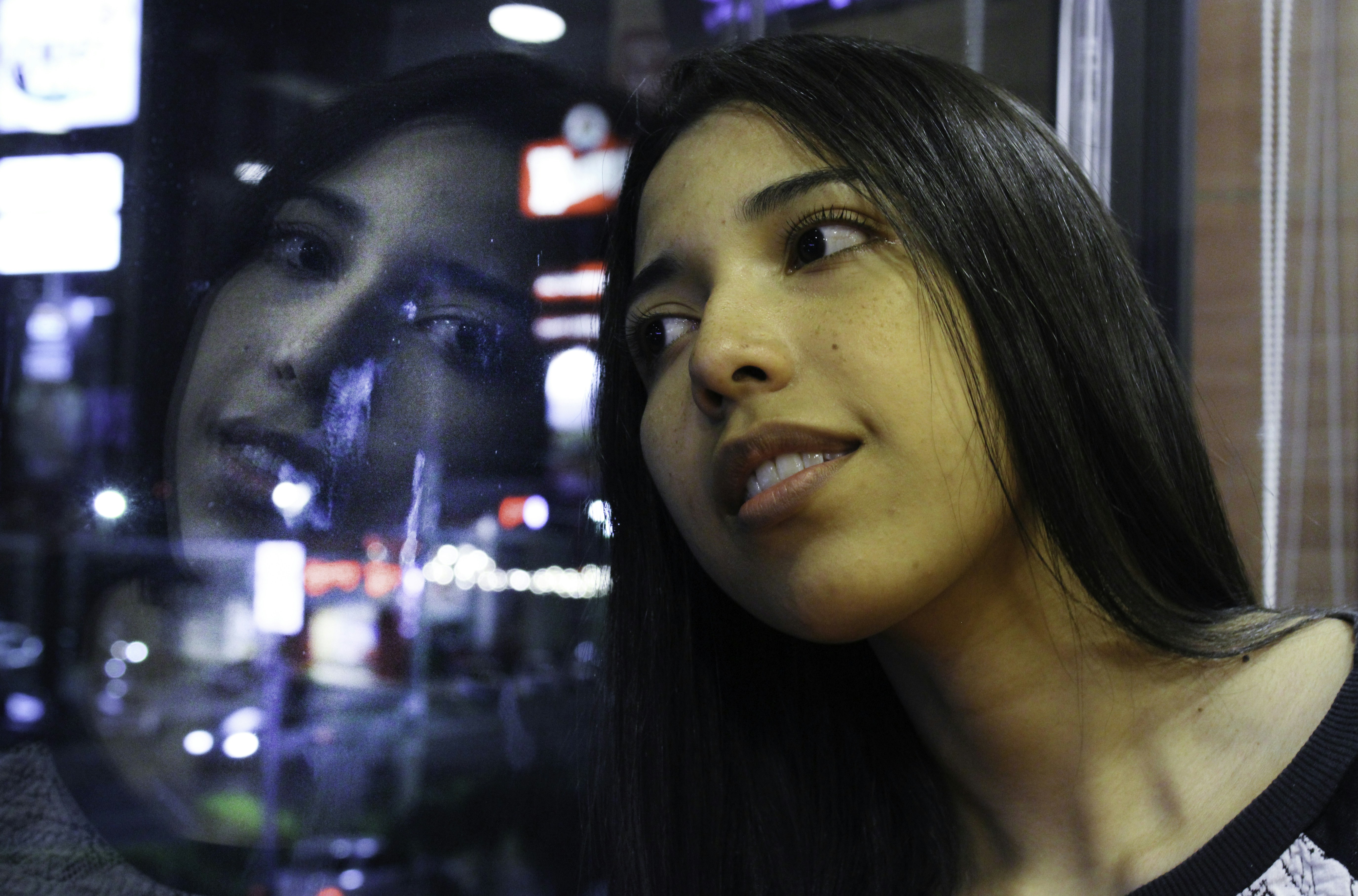 Neon Night Reflection: Quiet Confidence in a City Light