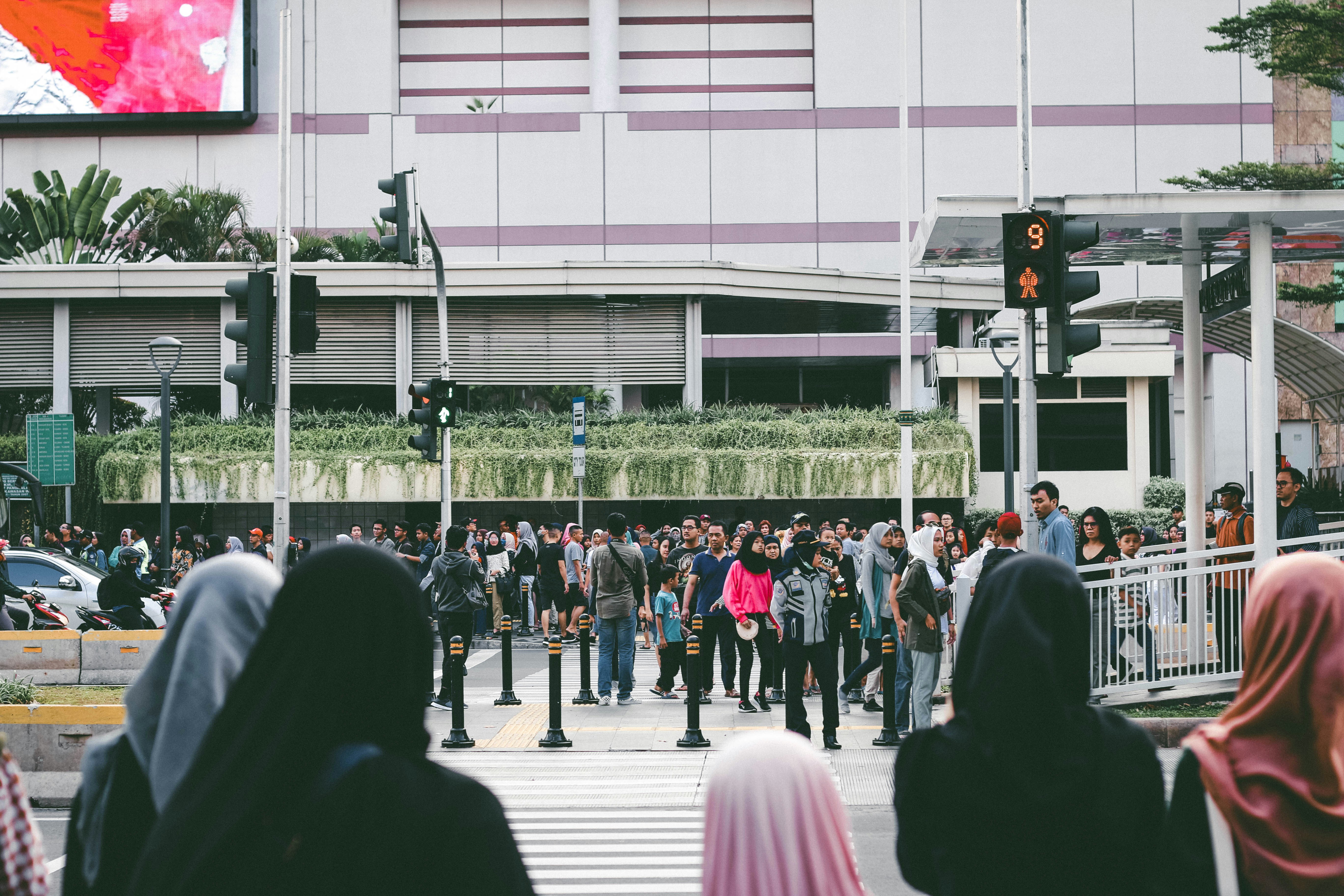 Urban Crosswalk Convergence: A Multicultural Pause at the City Crossing