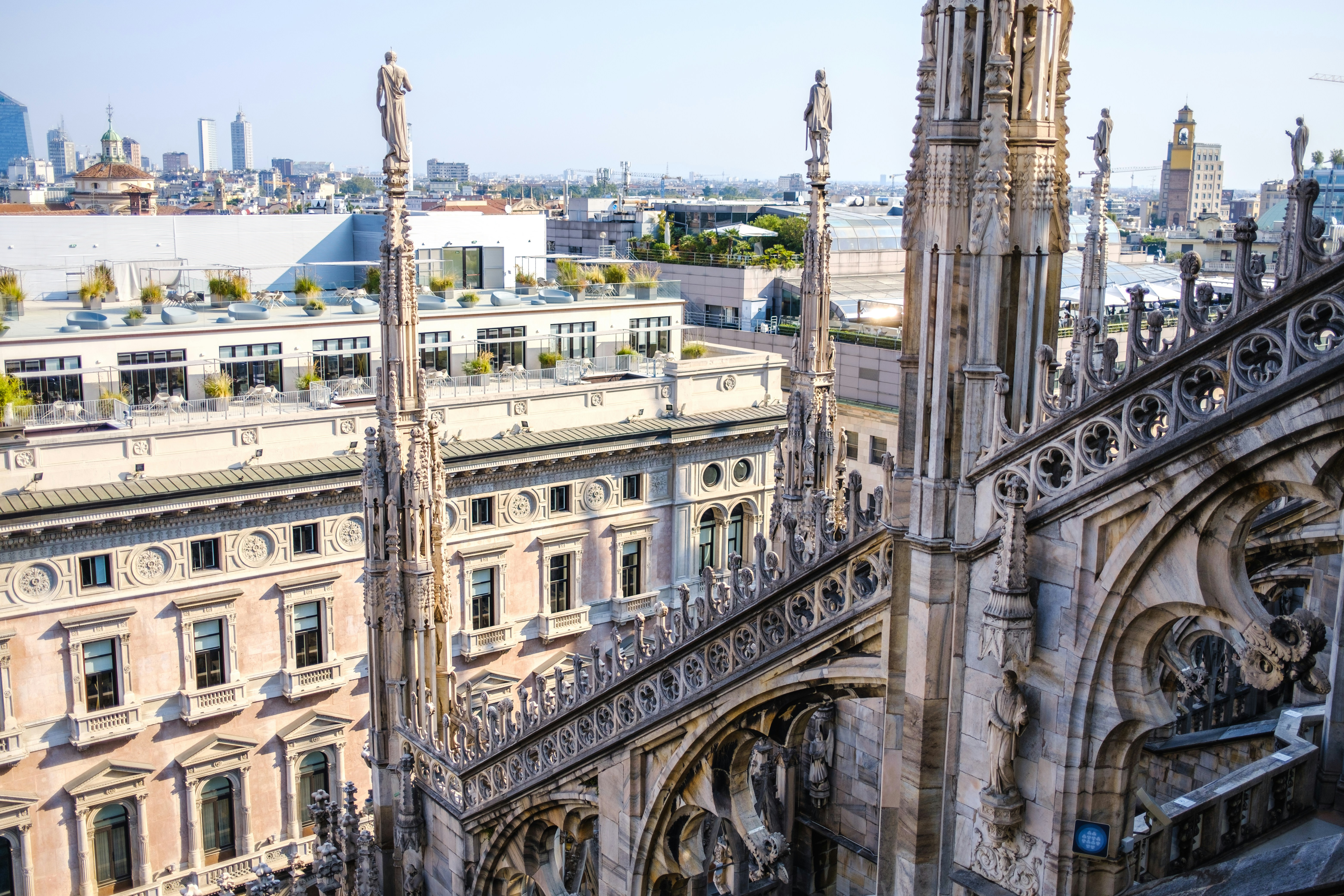 A view of a city from the top of a building photo – Free Milano Image ...