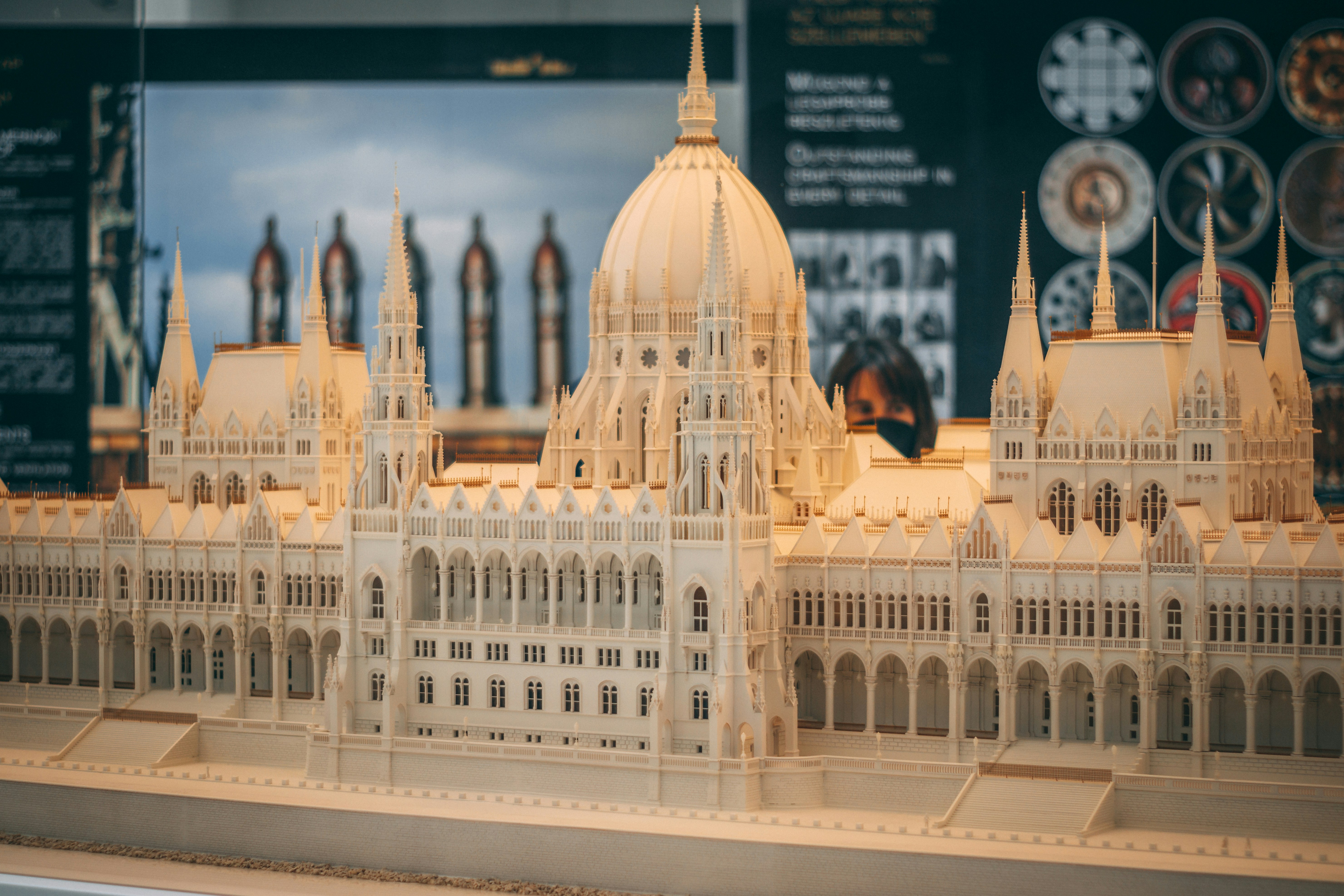 A model of a building is shown in a glass case photo – Free Travel ...