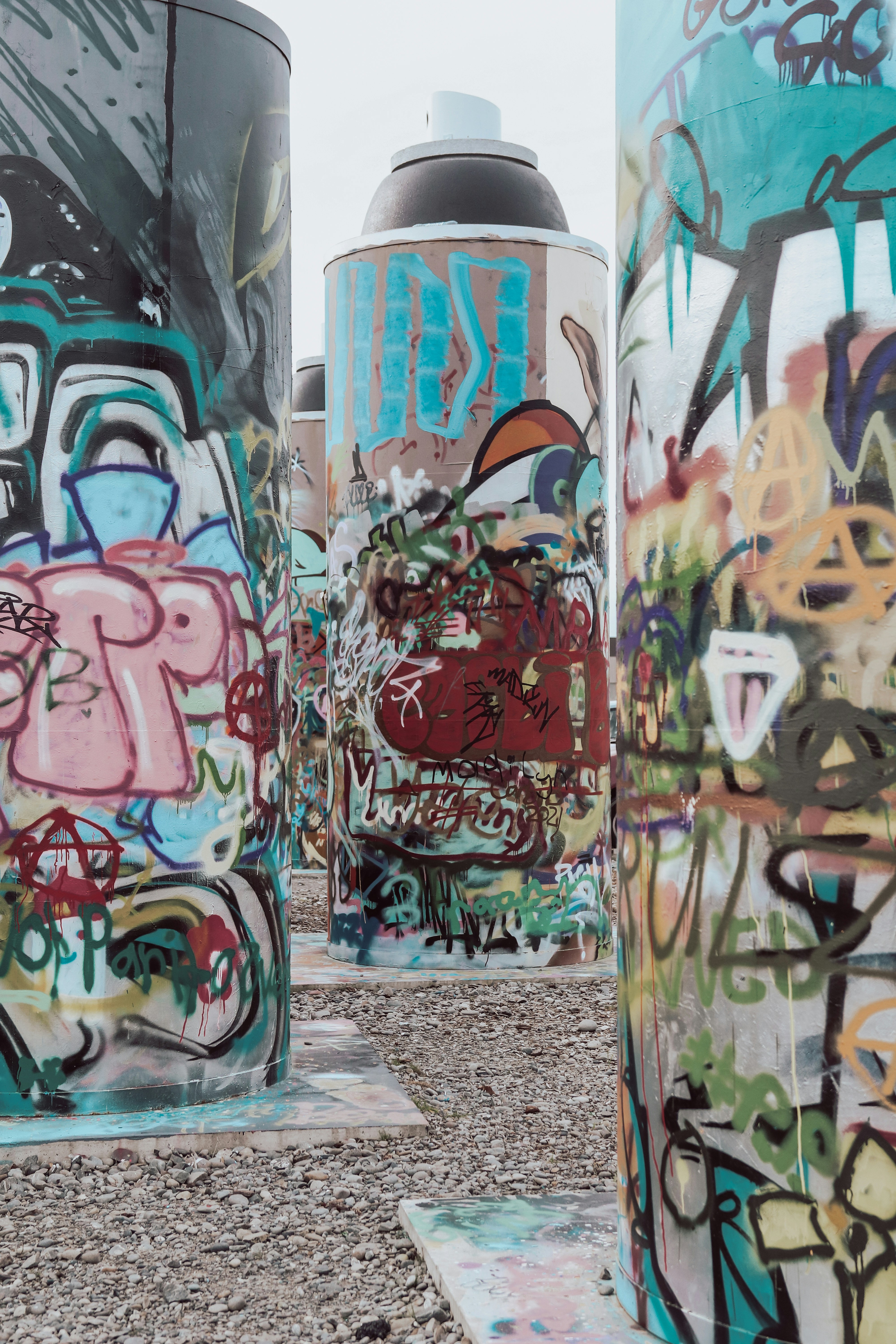 A bunch of graffiti on the side of a building photo – Free Graffiti ...