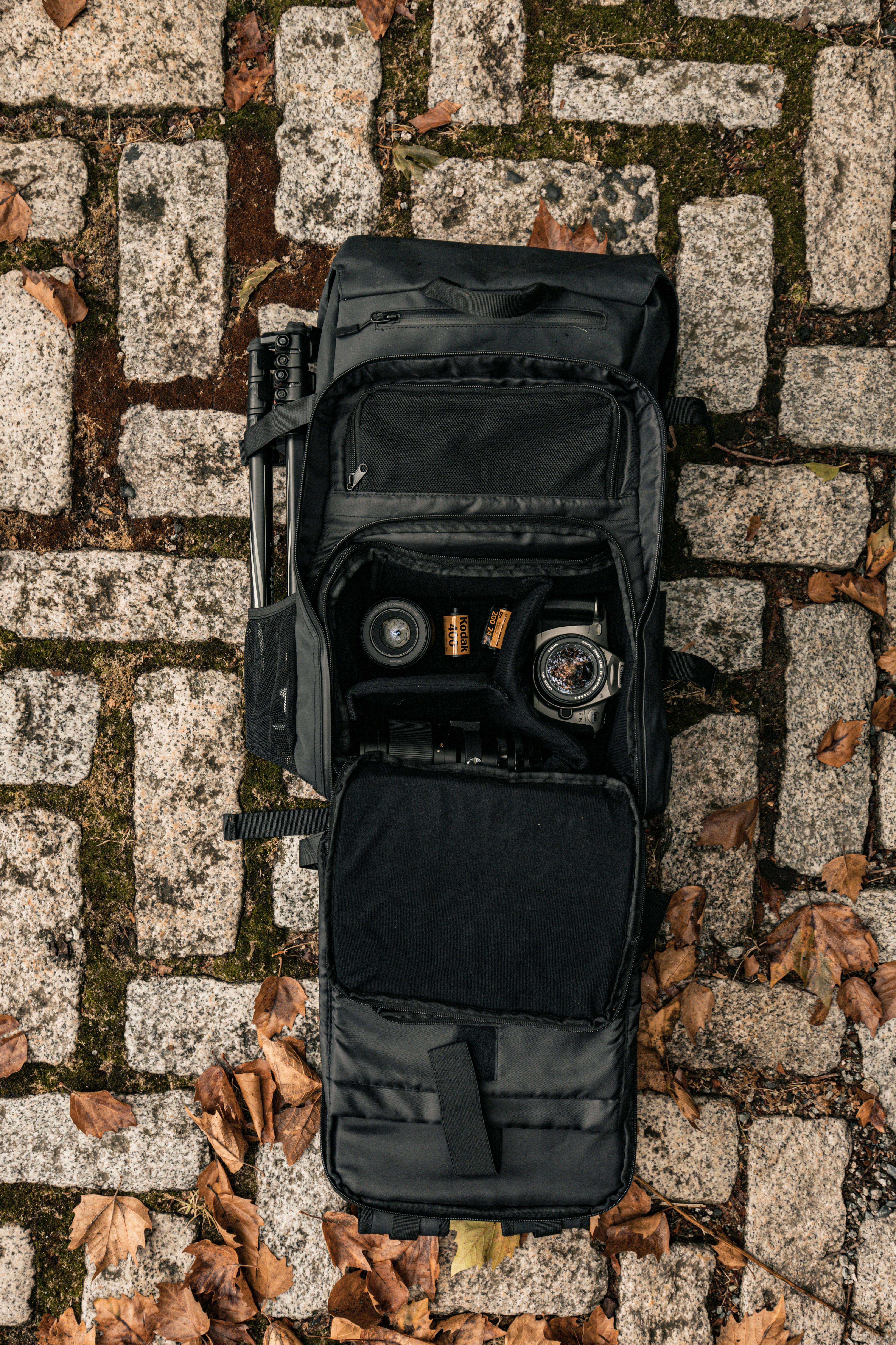Travel-ready Kit: Aerial View of a Compact Field Bag with Lenses