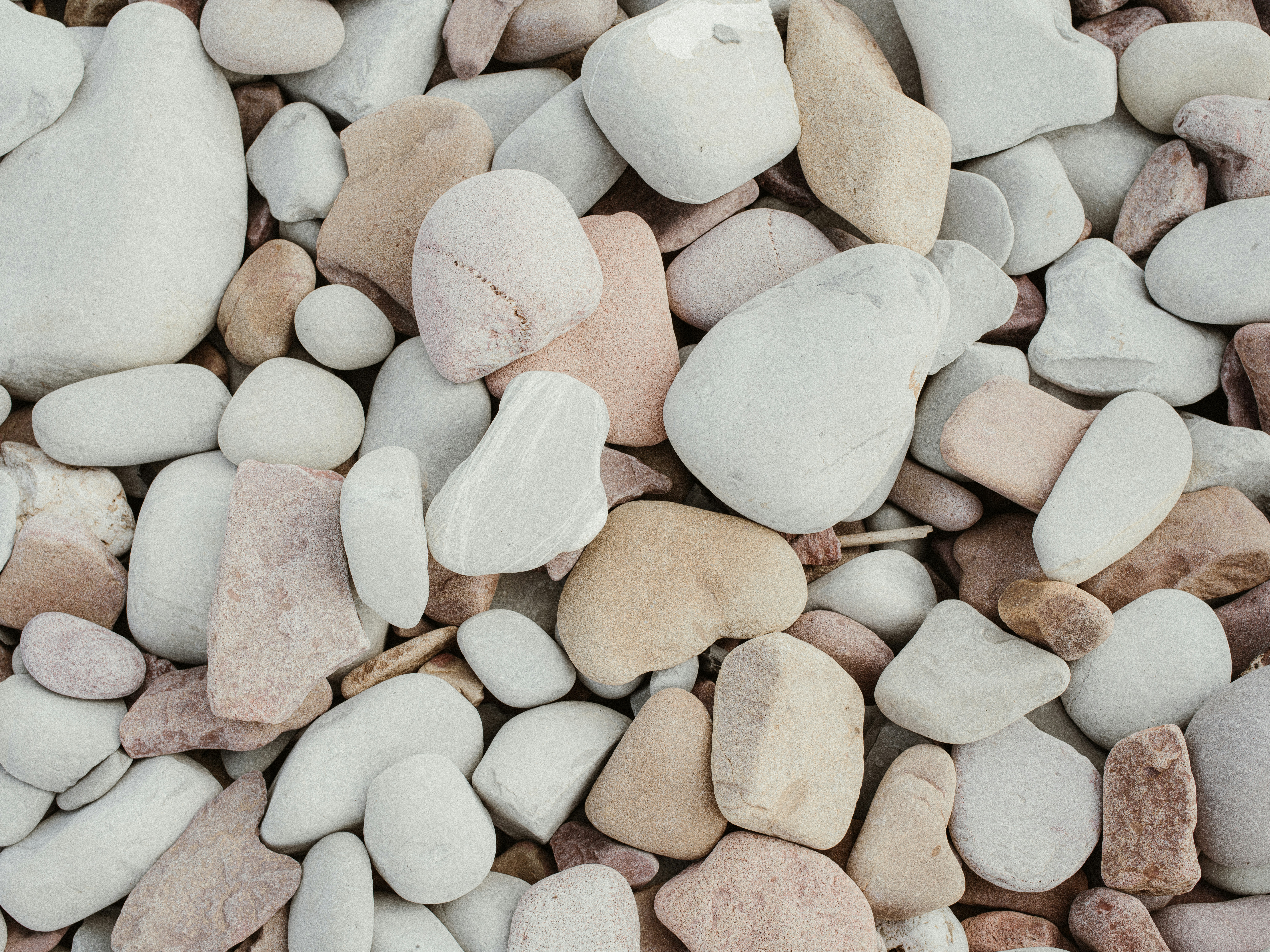 A bunch of rocks that are on the ground photo – Free Kilve beach Image ...