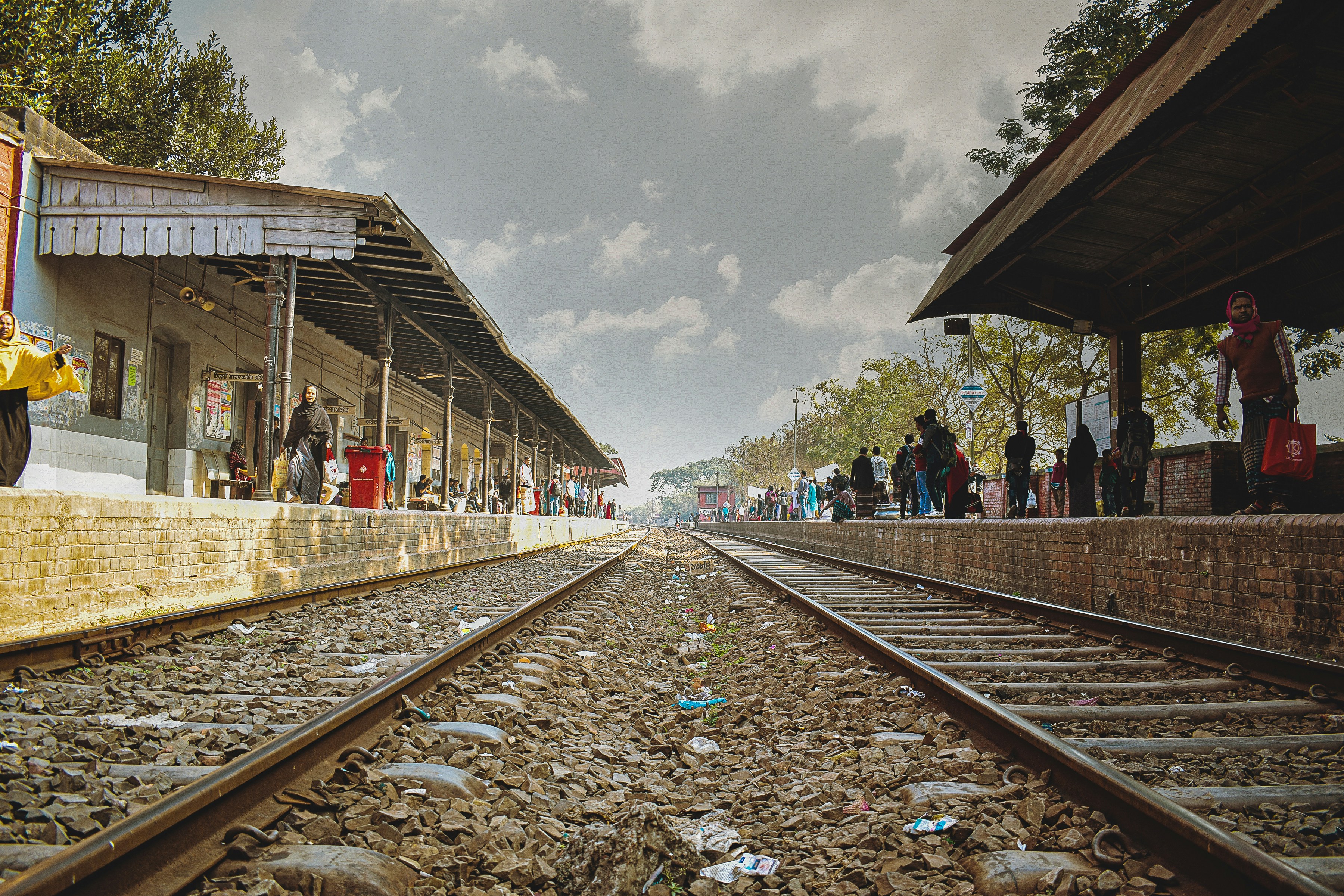 Horizonbound Rails: A Busy Platform Framing the Vanishing Point