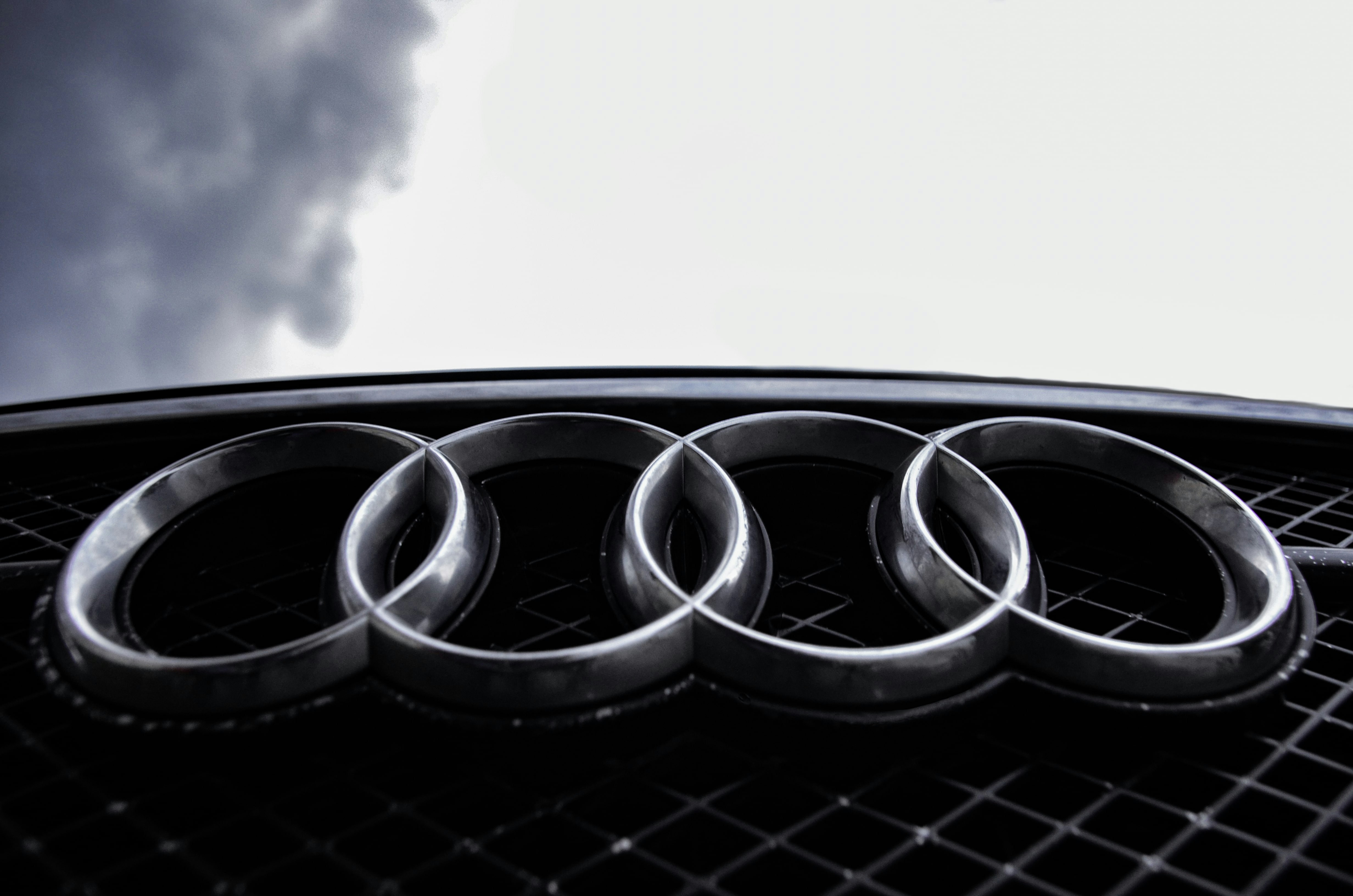 Audi Logo Design History: Evolution of the Four Rings from 1909 to Today