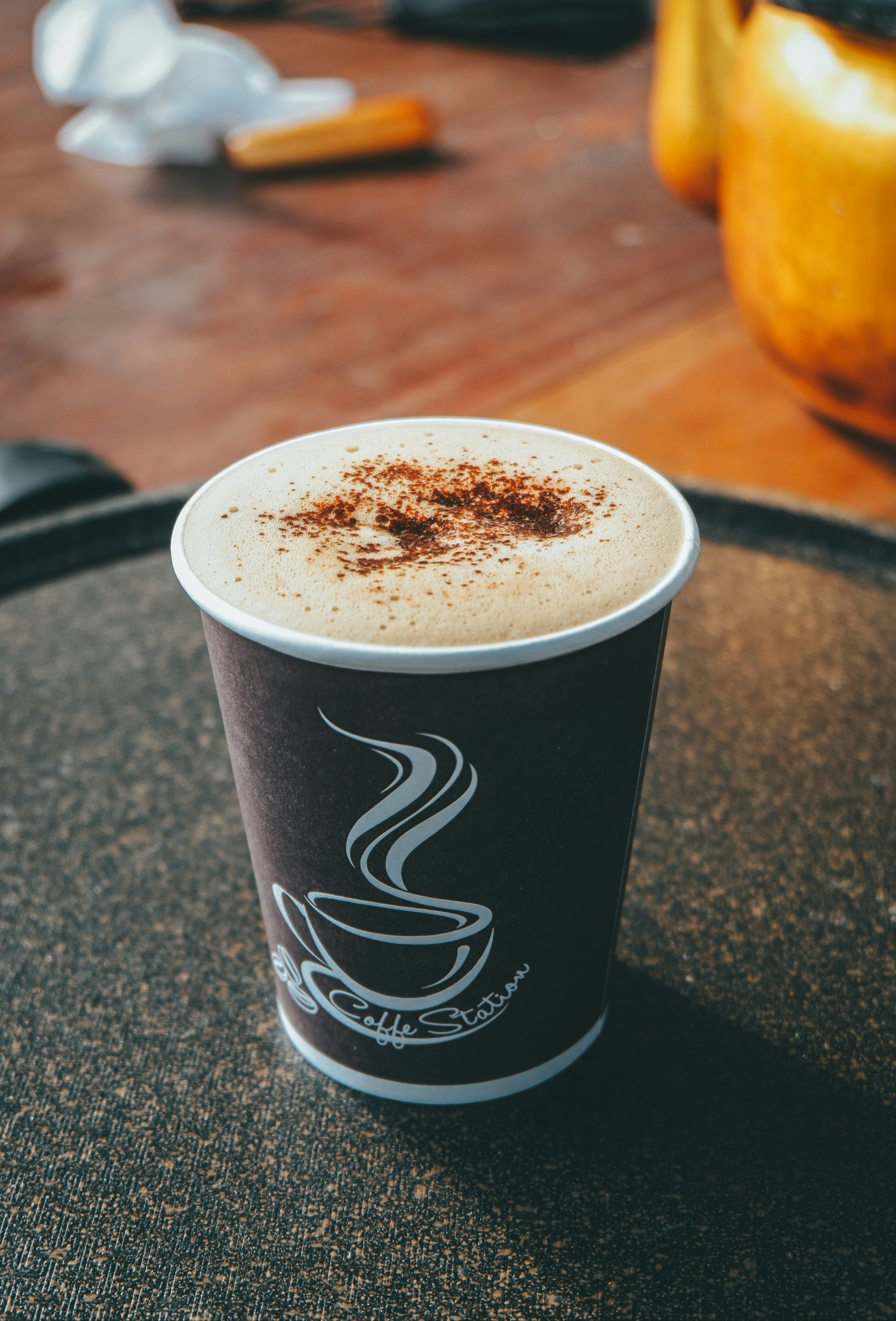 Steam on a Textured Table: A Solo Coffee Cup Portrait