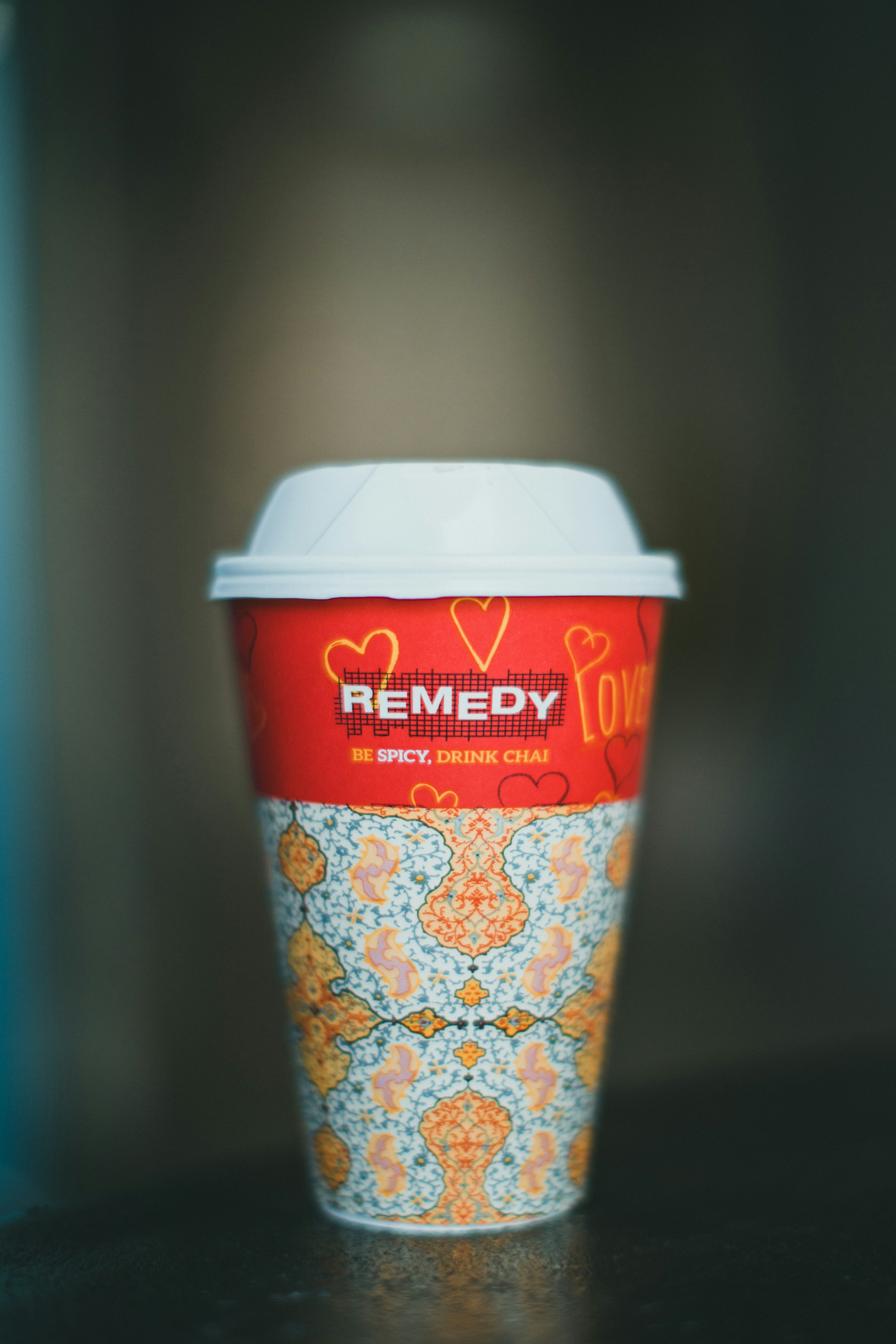 Remedy Cup in Focus: Hearts, Pattern, and Quiet Bokeh