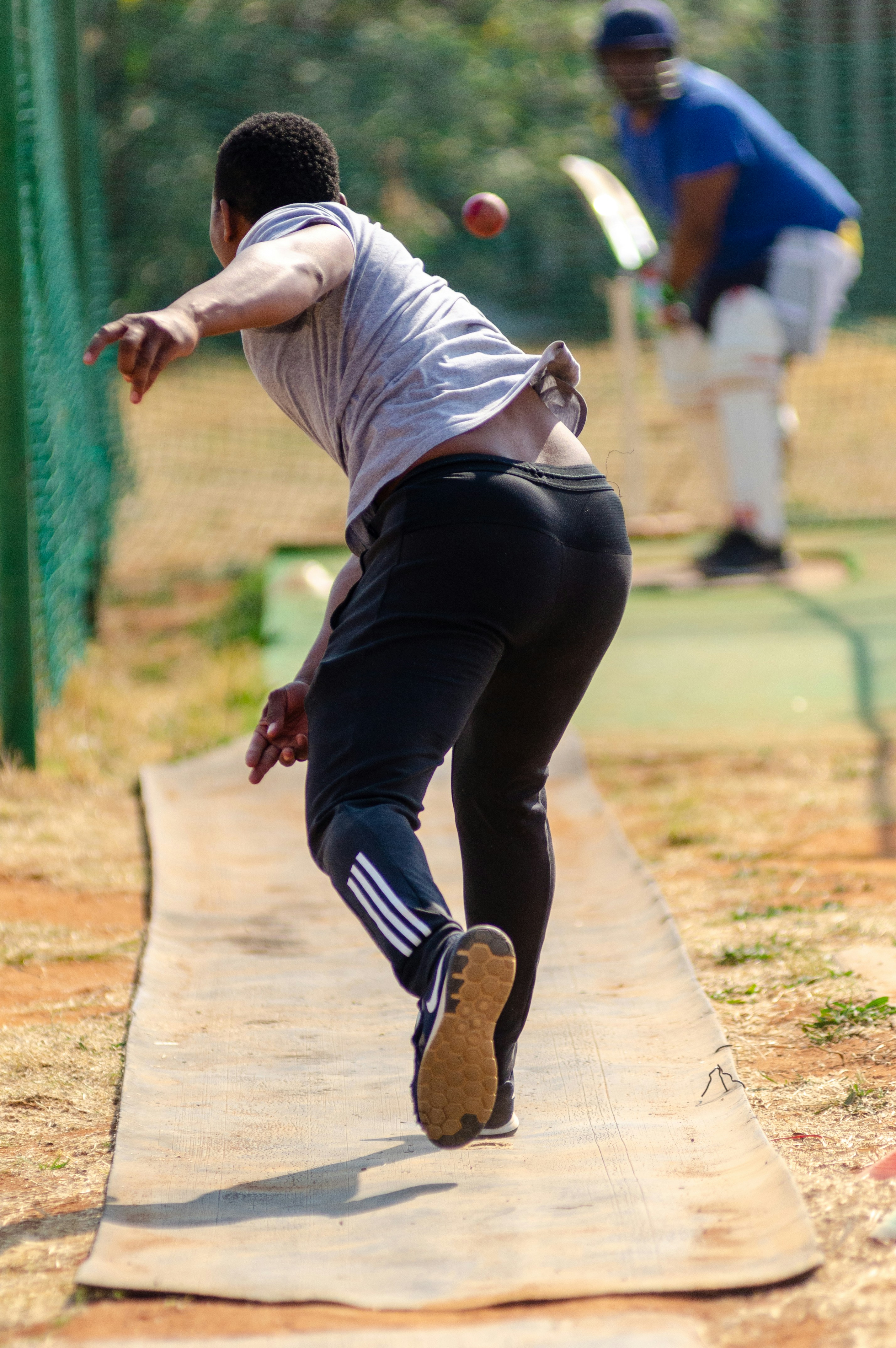 Leap of Focus: Pitcher in Motion on the Pitching Lane