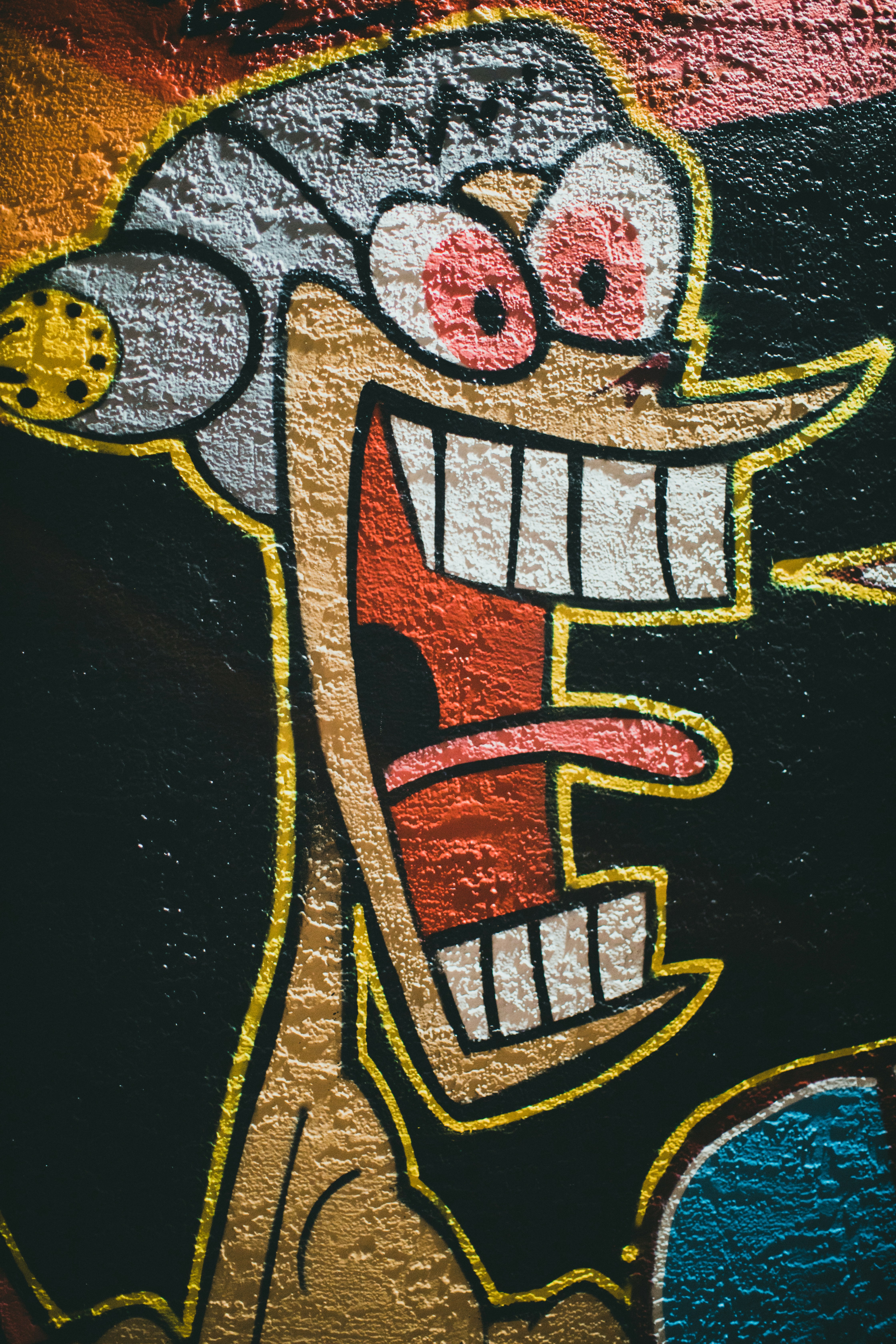 A close up of a painting of a cartoon character photo – Free Art Image ...