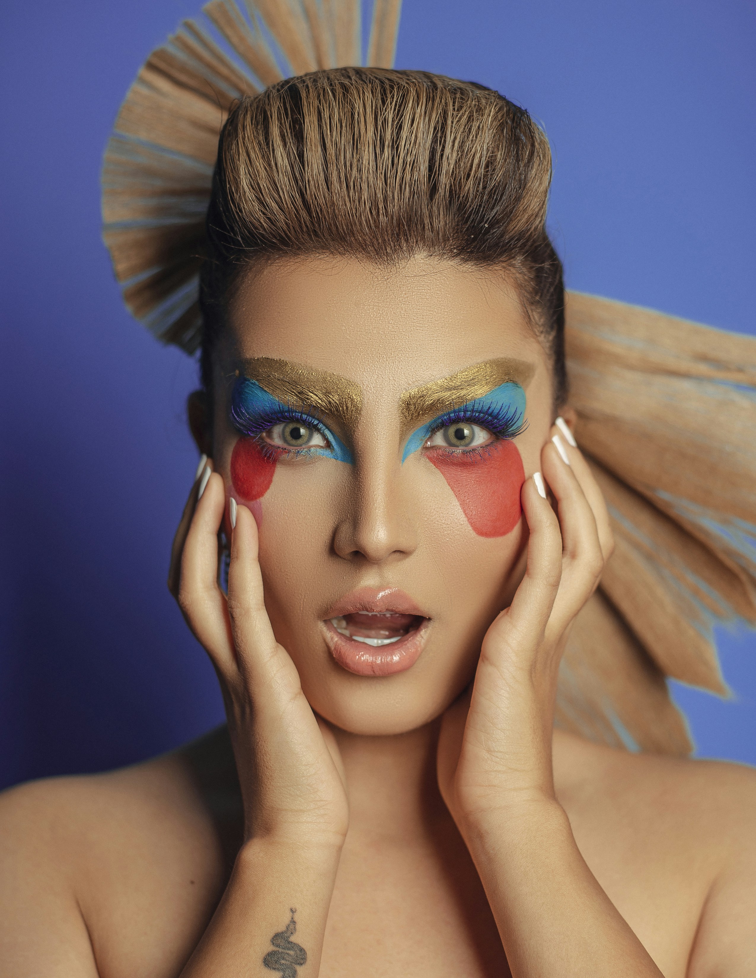 A woman with a colorful make - up on her face photo – Free Expression ...